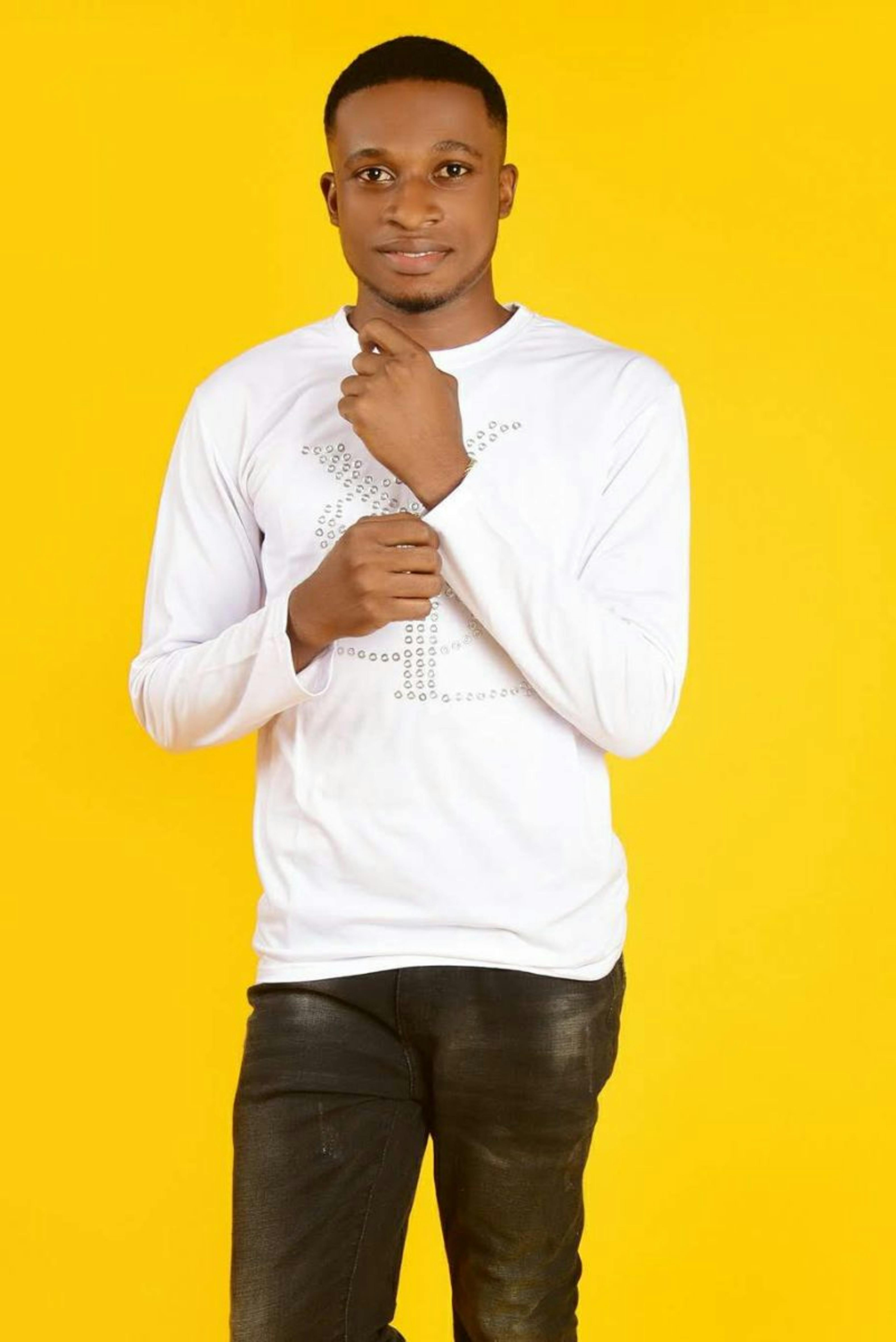 Man in White Shirt Standing on Yellow Background · Free Stock Photo