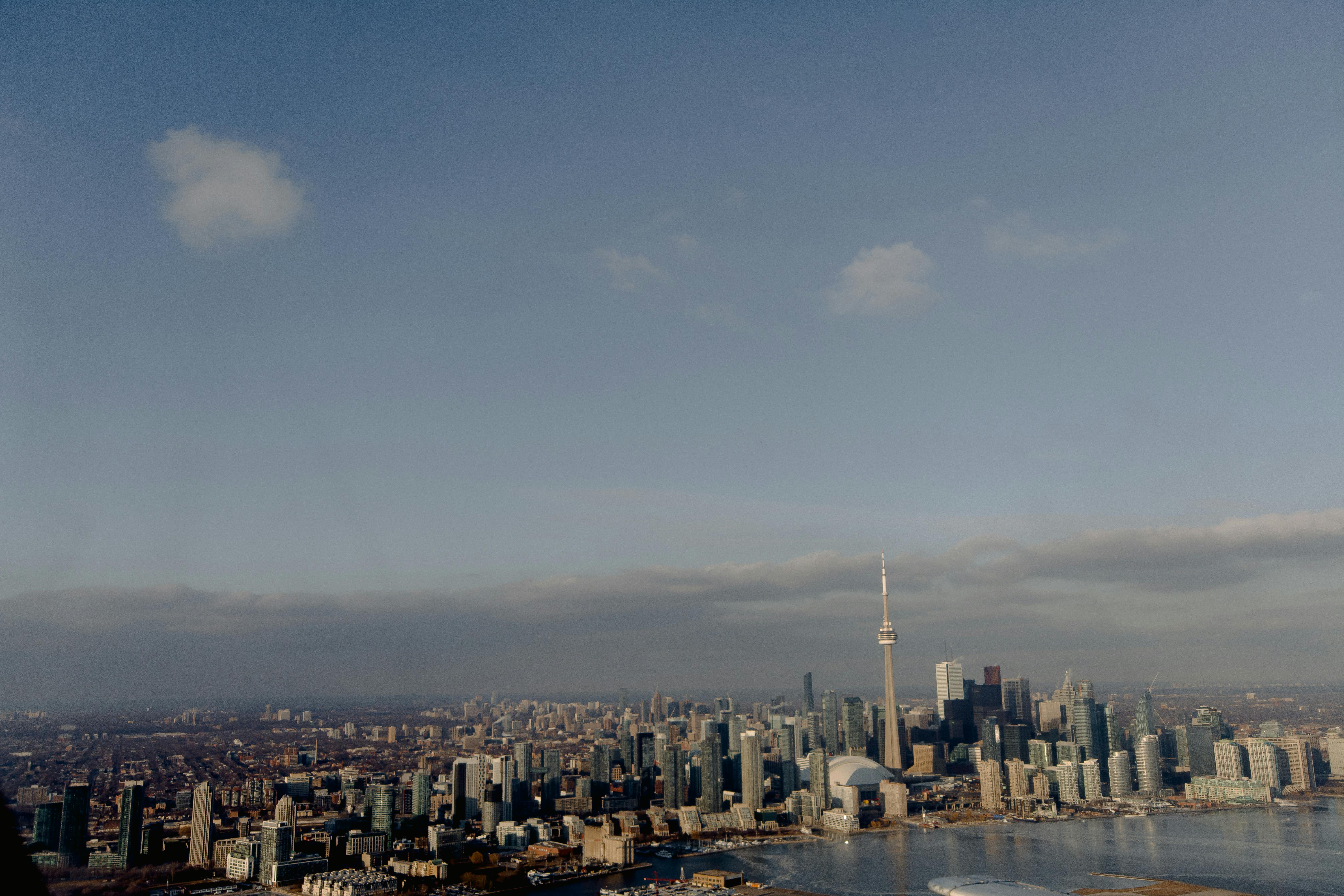 Cityscape with modern architecture of megapolis on river shore · Free ...