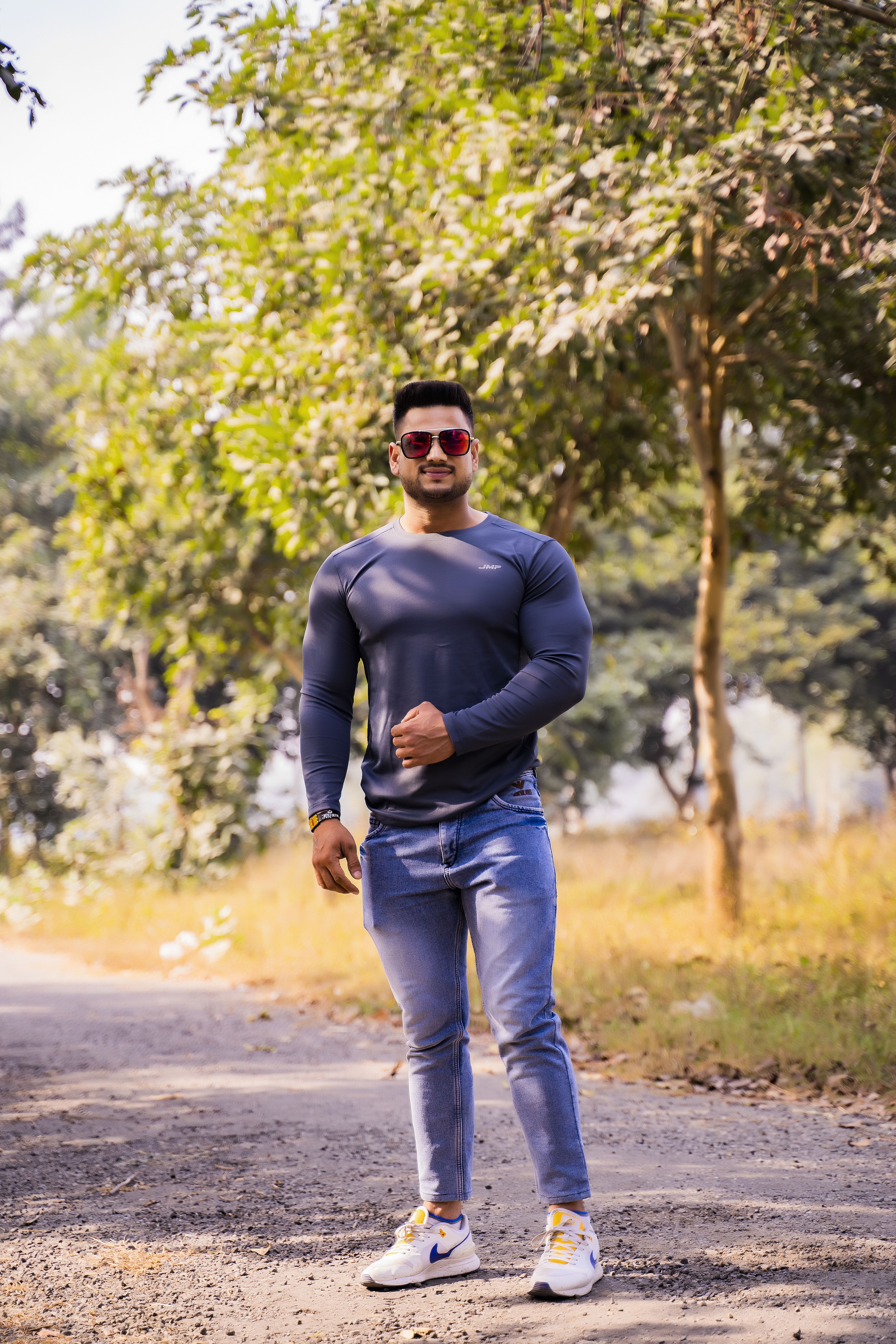 Man in Blue Long Sleeve Shirt With Muscular Body · Free Stock Photo