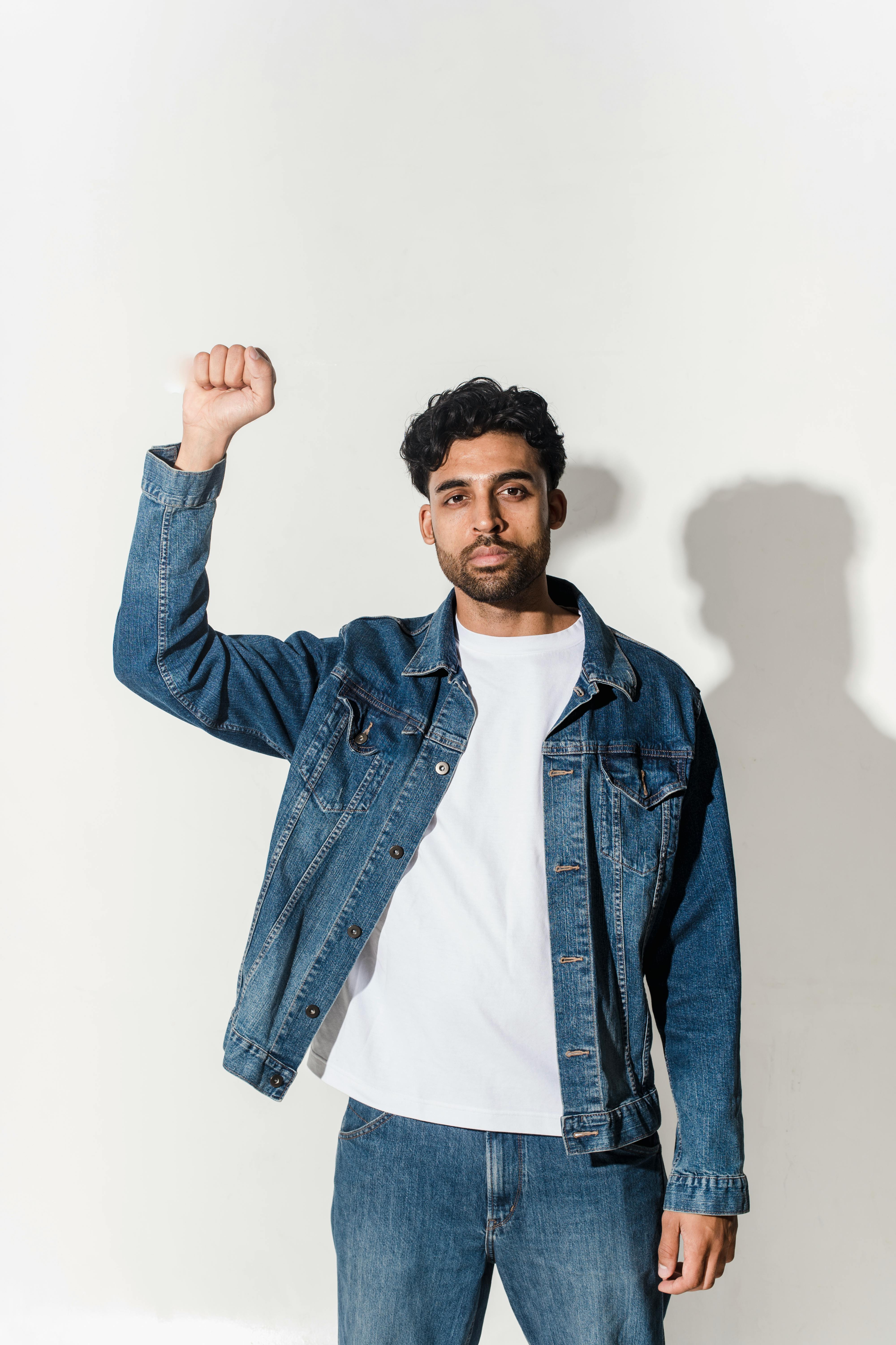 A Man with a Raised Fist · Free Stock Photo