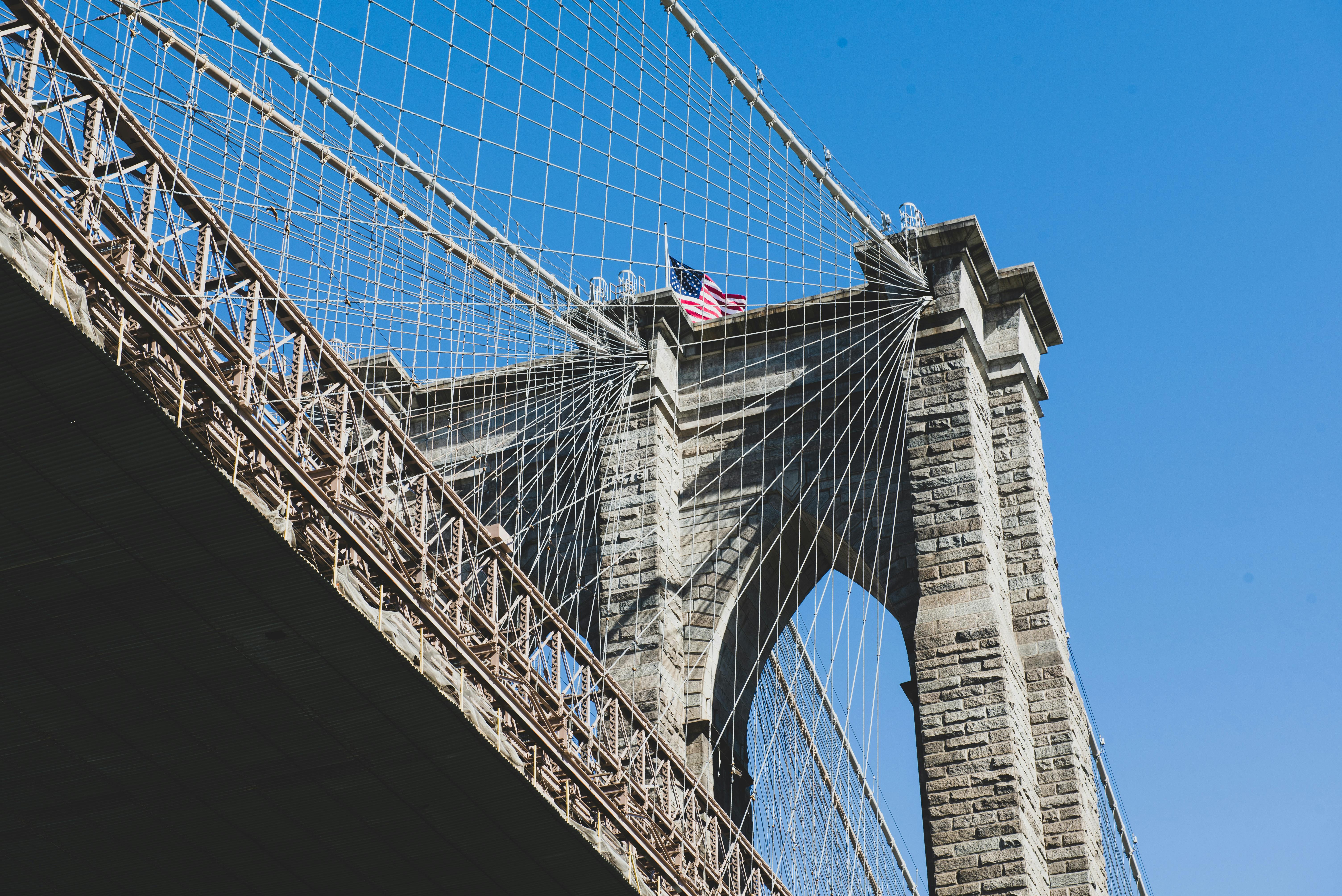 american flag on top of bridge · Free Stock Photo