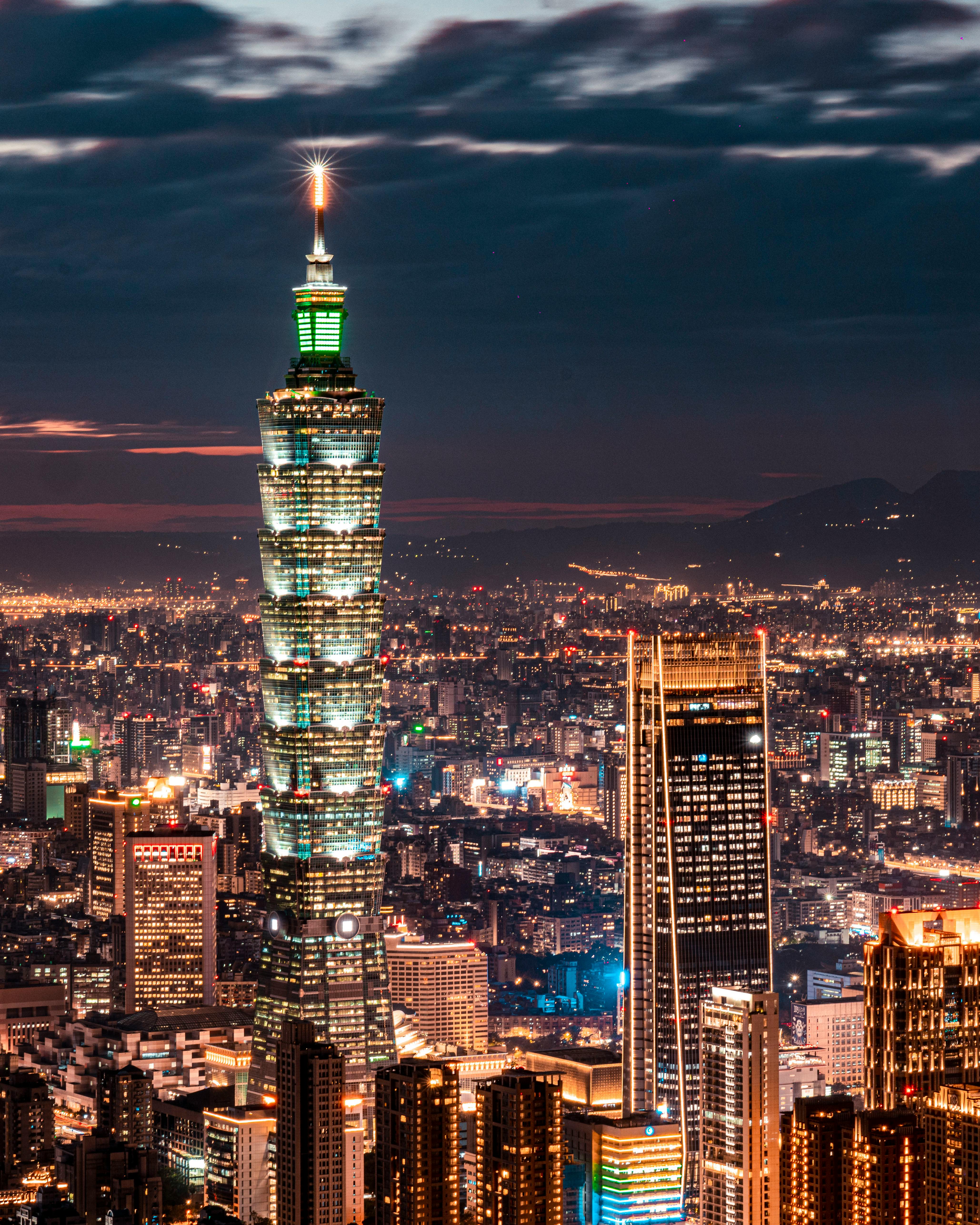 High Rise Buildings During Night Time · Free Stock Photo