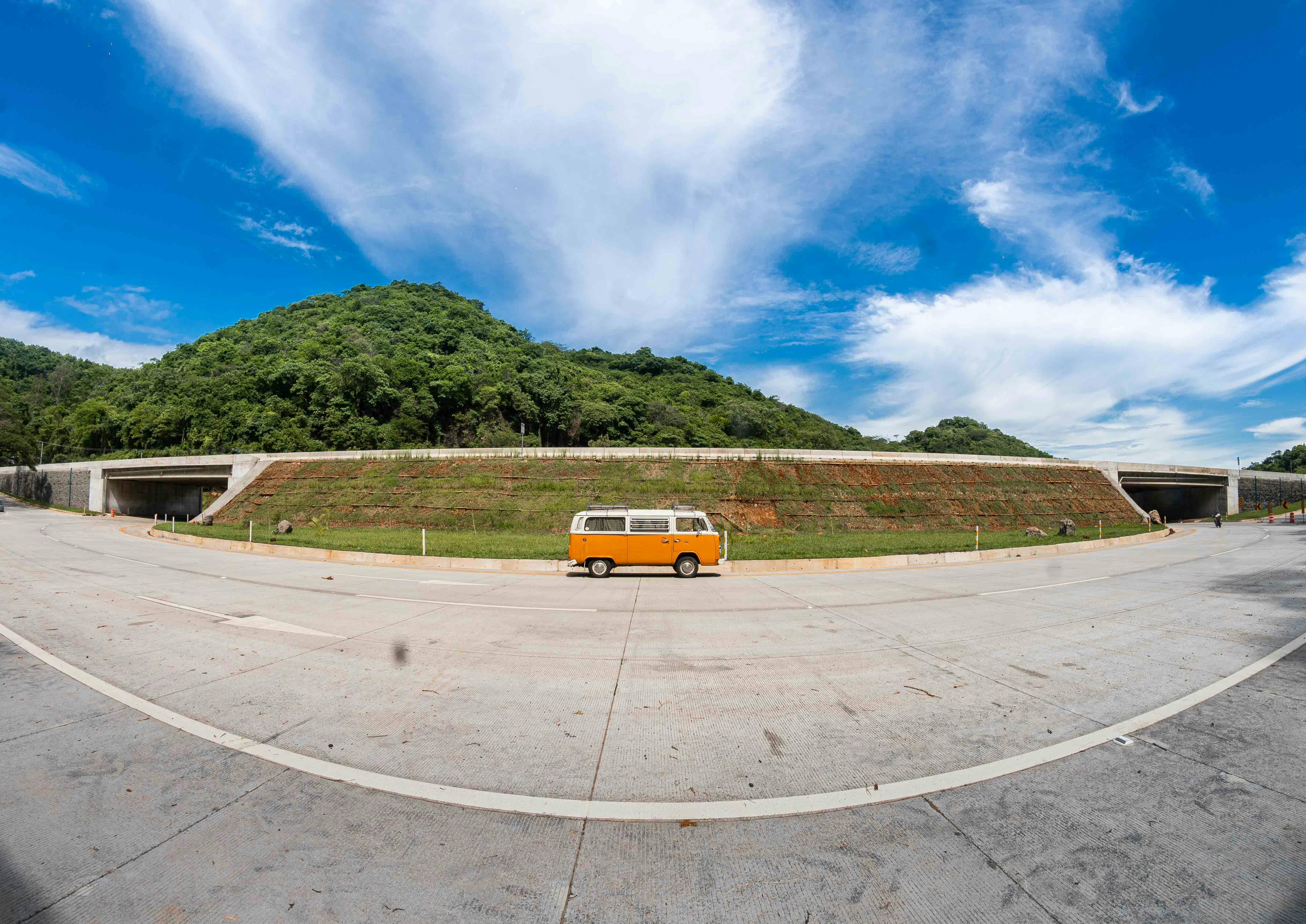 Orange Van on Road Under Blue Sky · Free Stock Photo