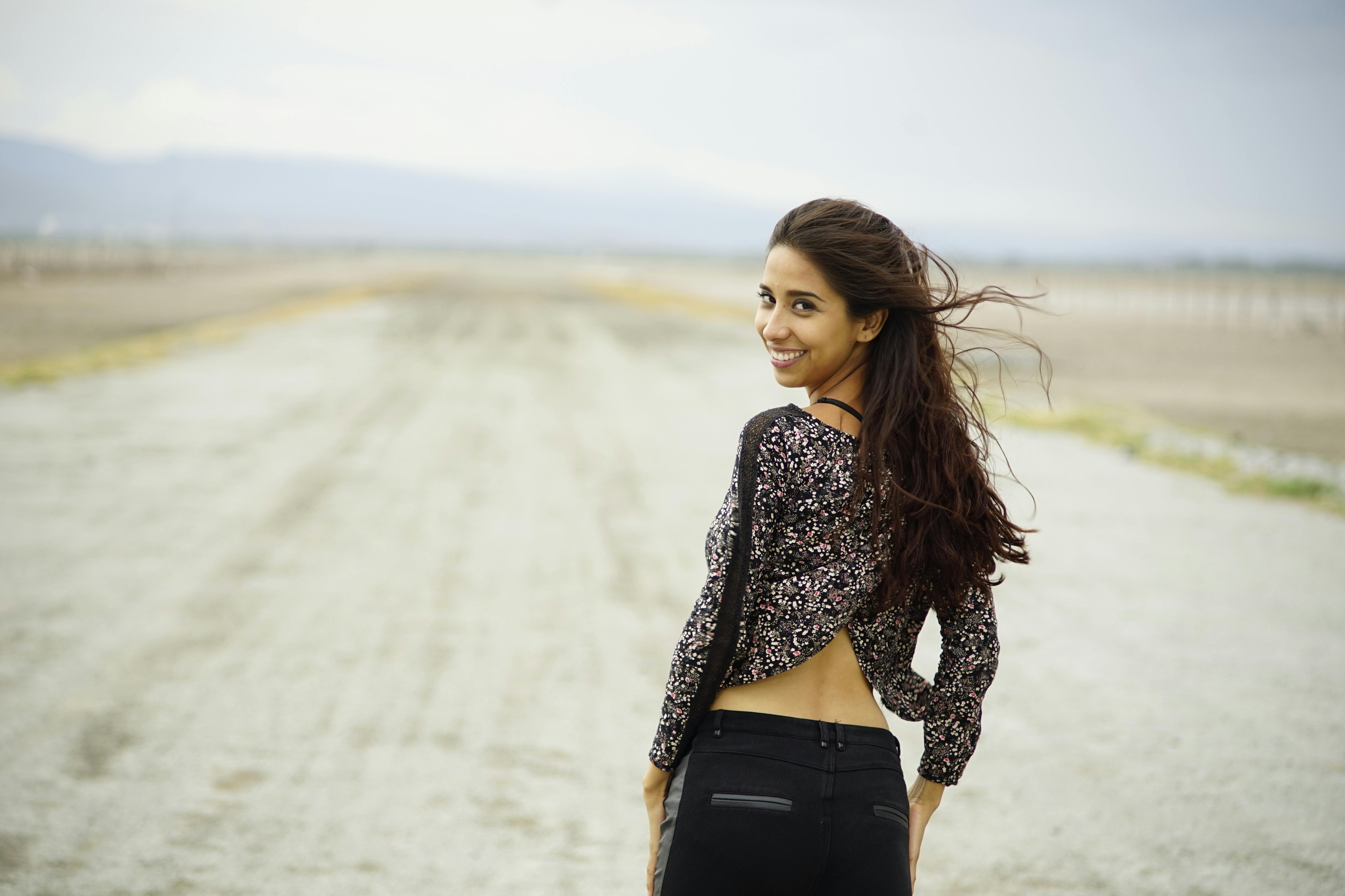 Pretty Women Standing Beside a Climbing Wall · Free Stock Photo