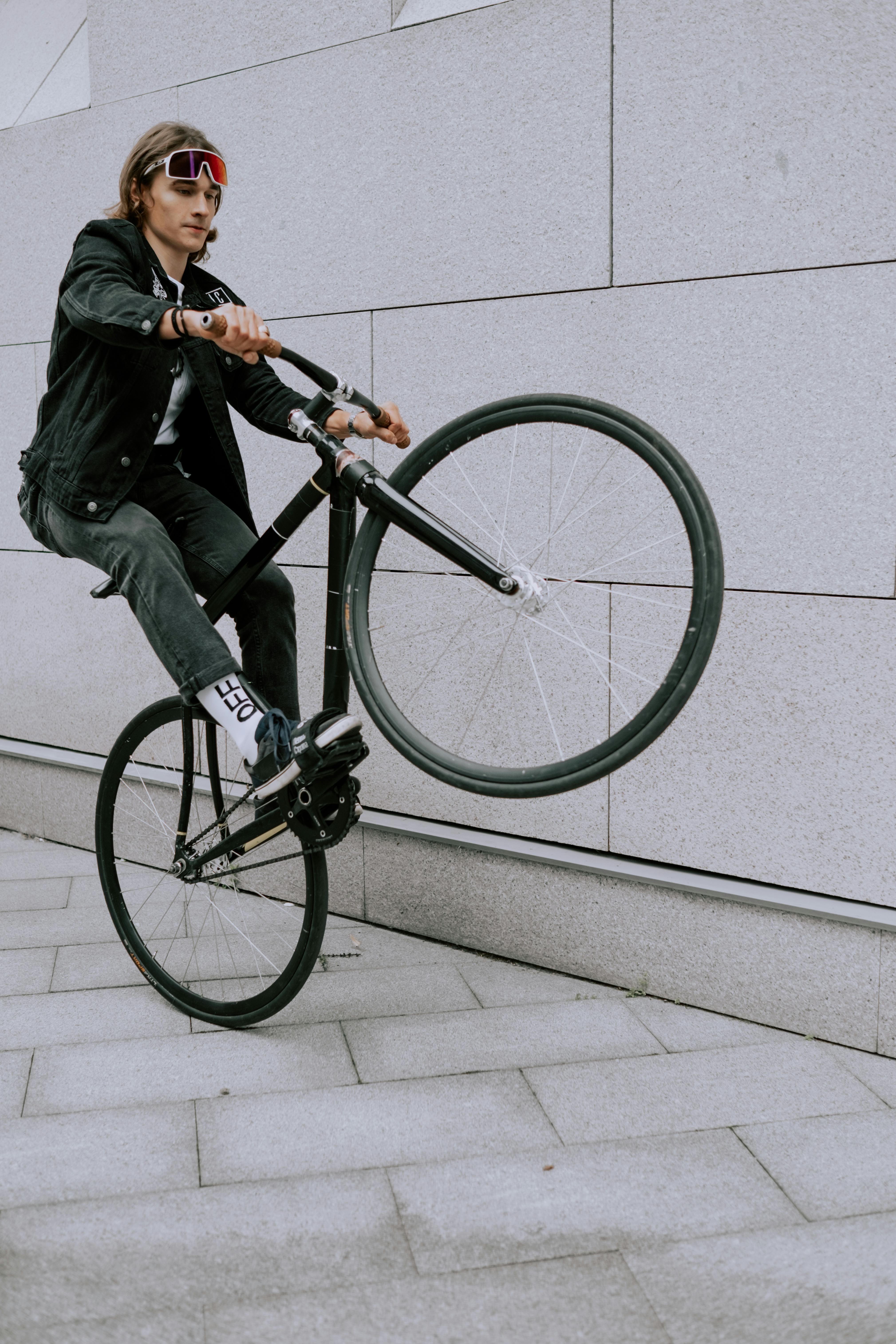 Person Riding a Fixie Bicycle · Free Stock Photo