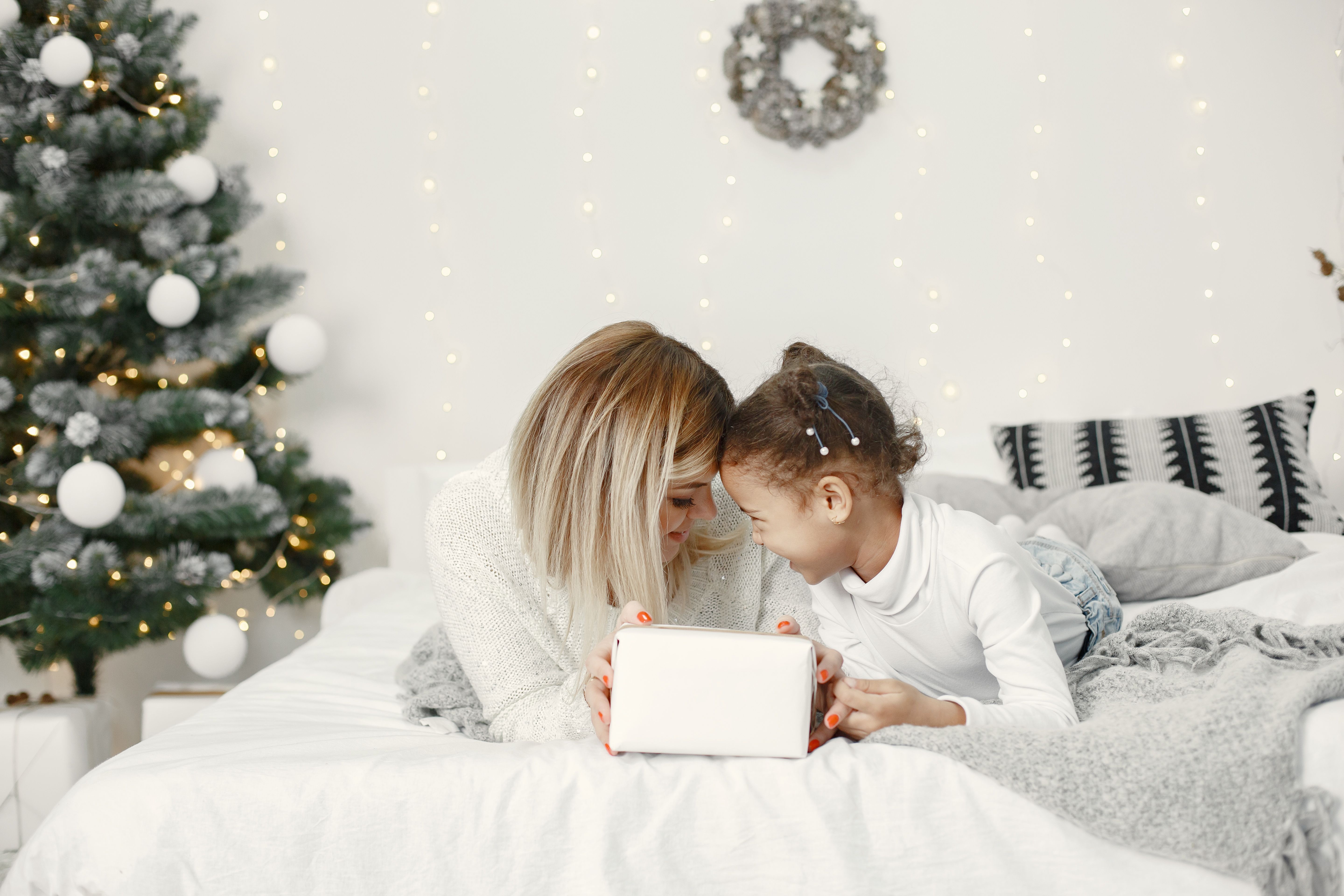 Woman and her Child Facing Each Other · Free Stock Photo