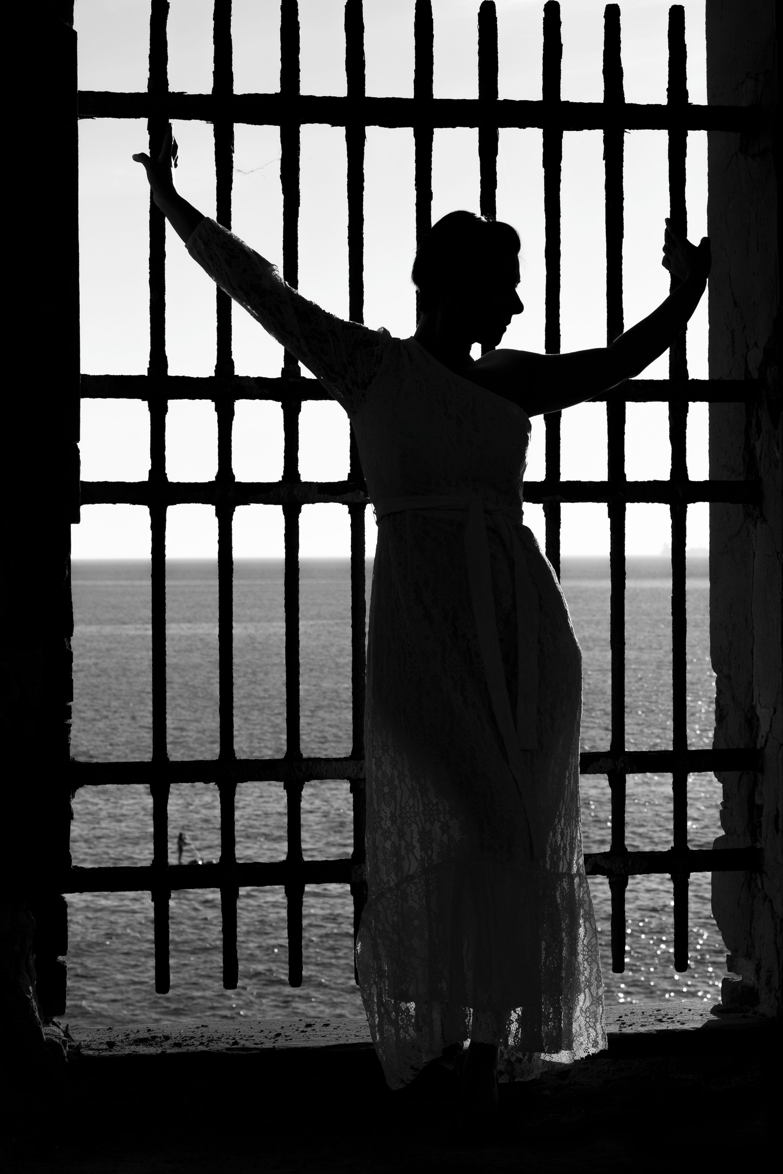 Silhouette of a Woman Standing · Free Stock Photo