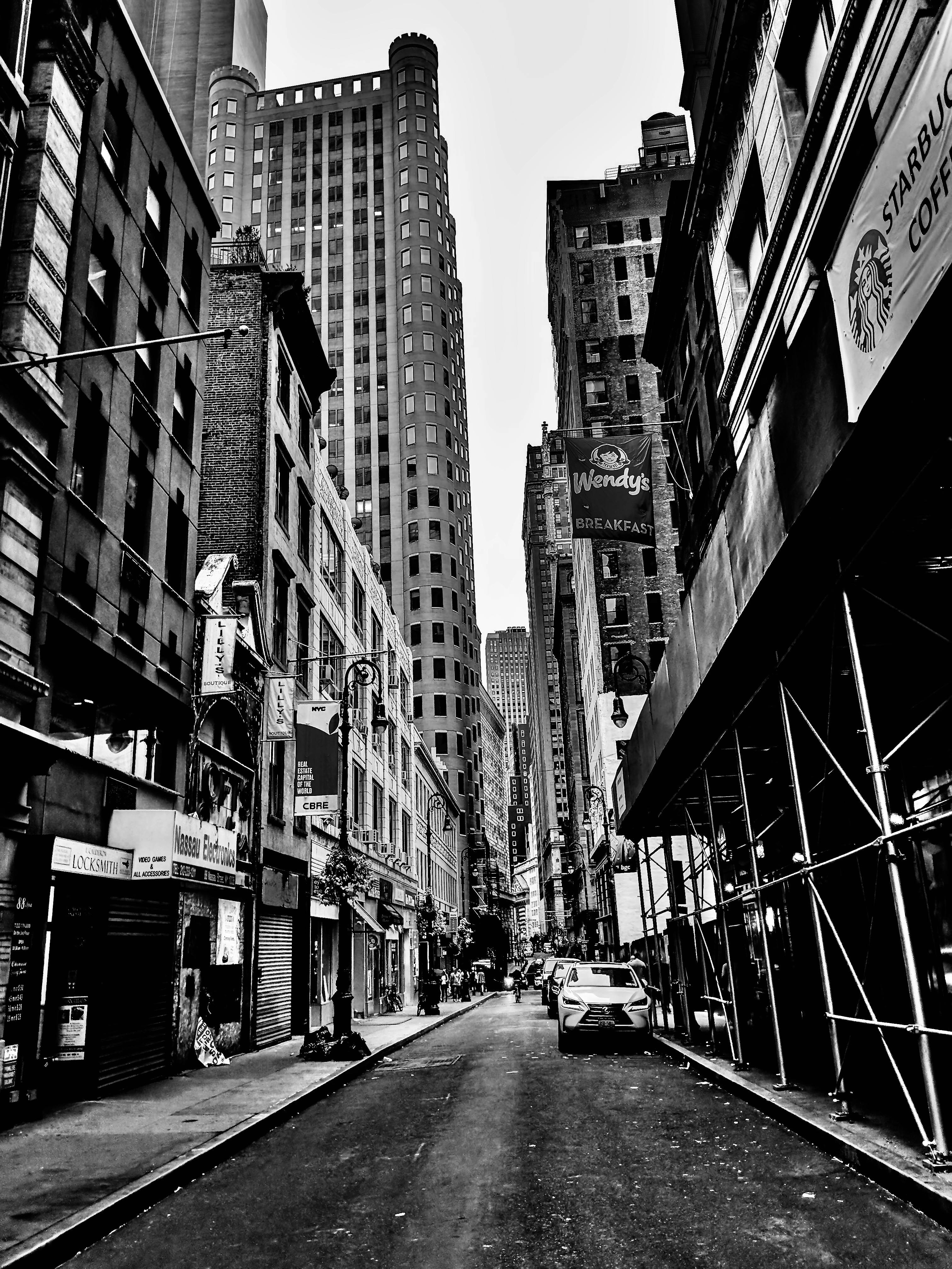 Gray Scale Photo of High Rise Building · Free Stock Photo