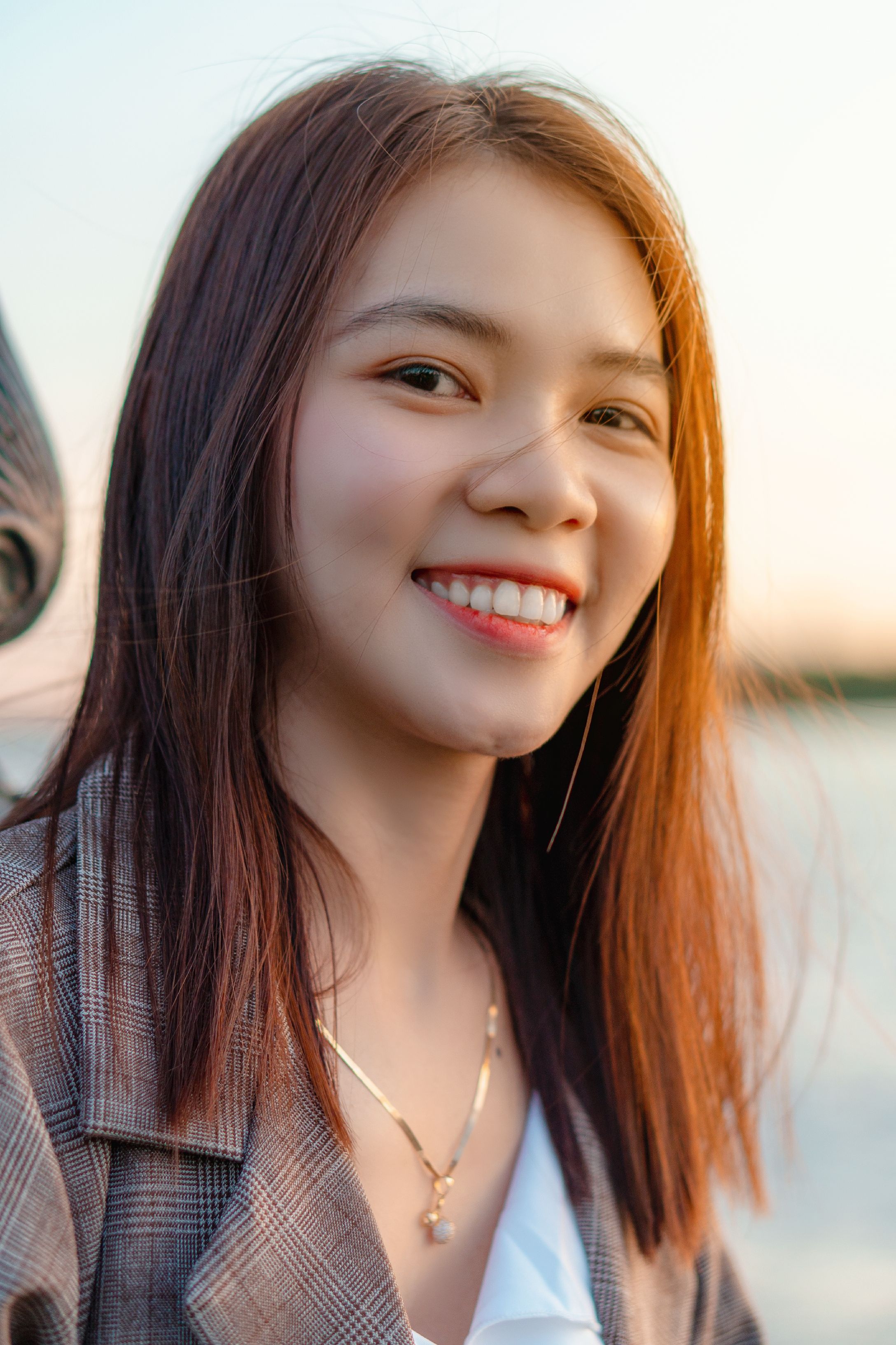 A Portrait of a Smiling Woman · Free Stock Photo