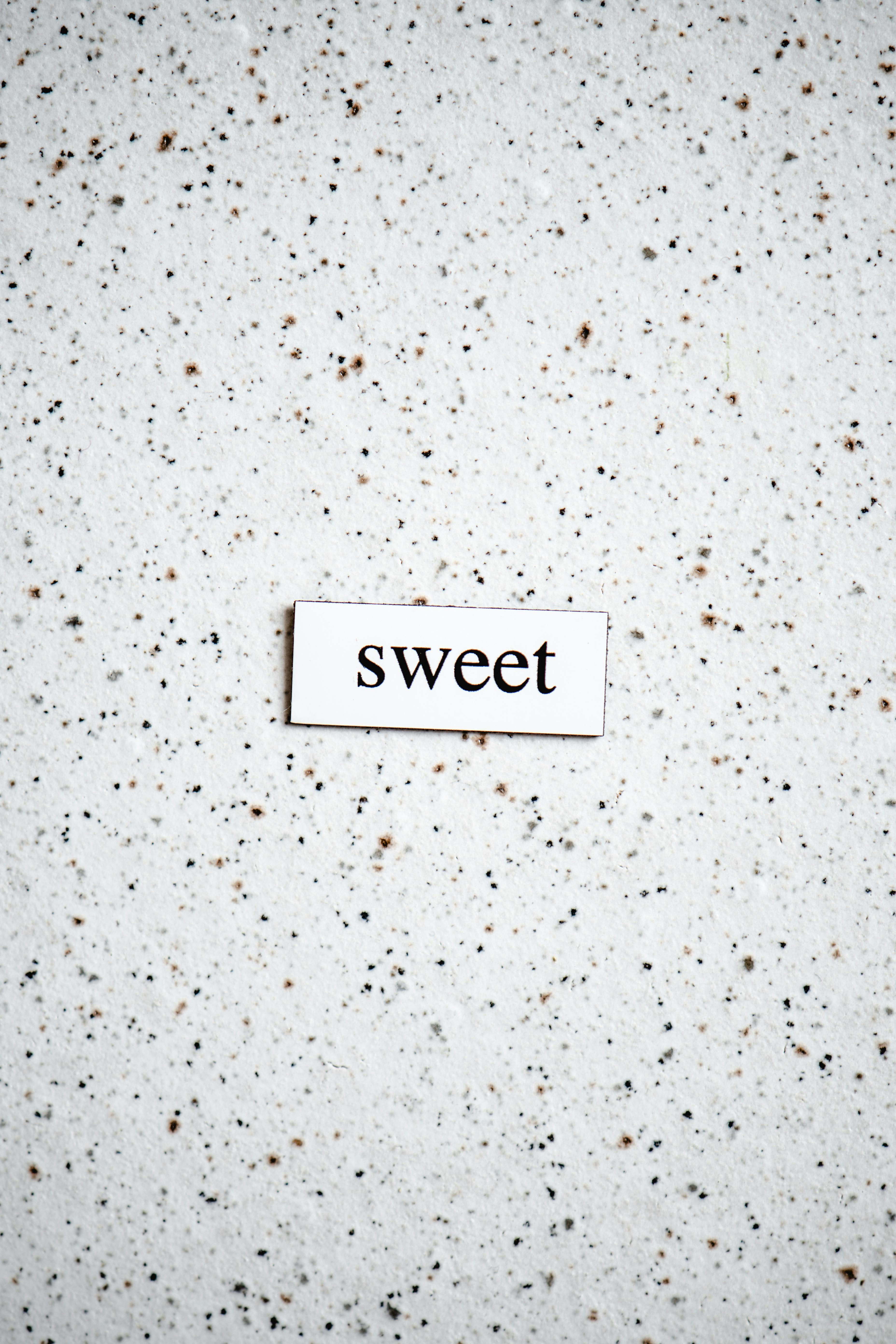 Sweet Sign on Rough Surface · Free Stock Photo