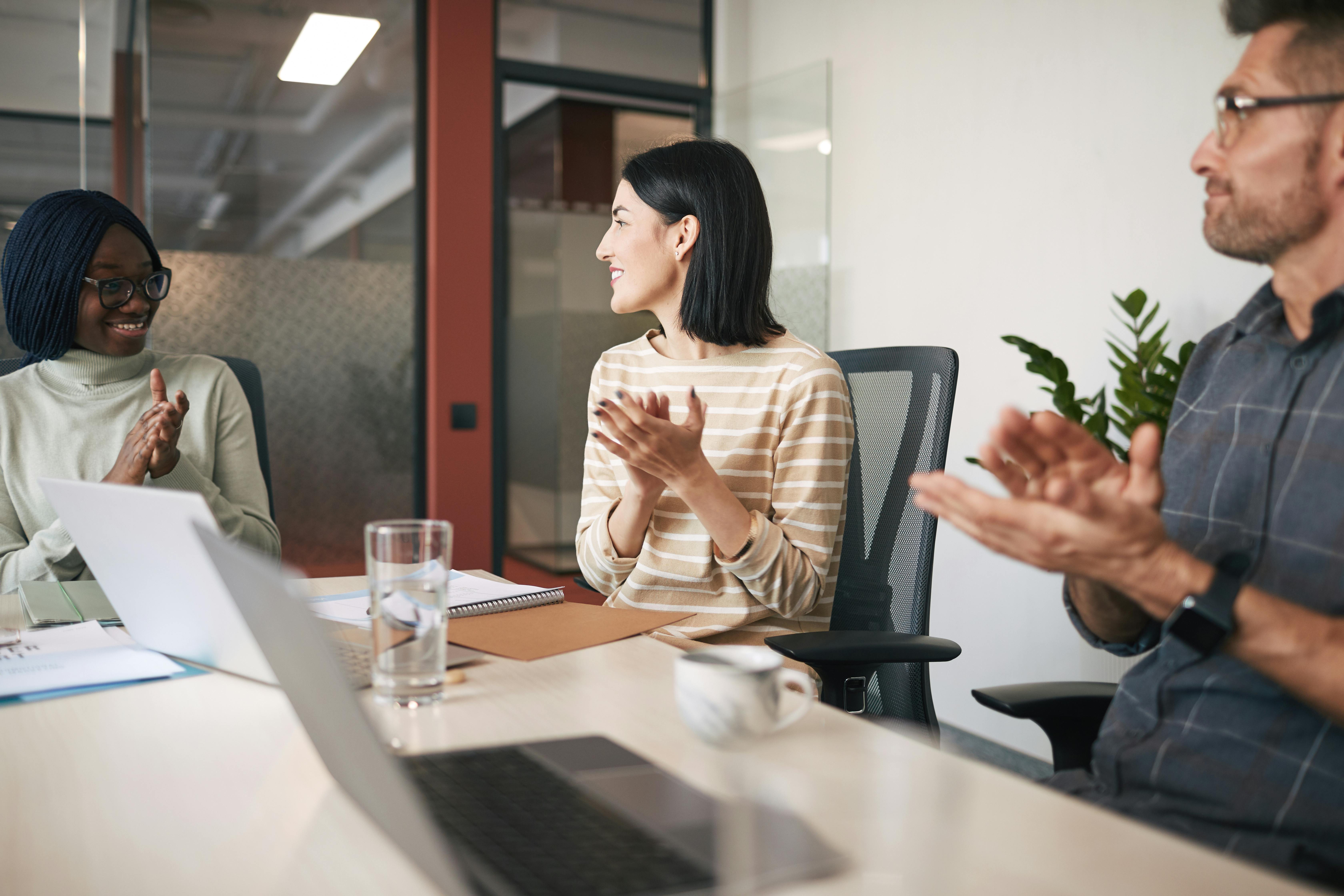 Photo Of People Sitting On Chairs · Free Stock Photo