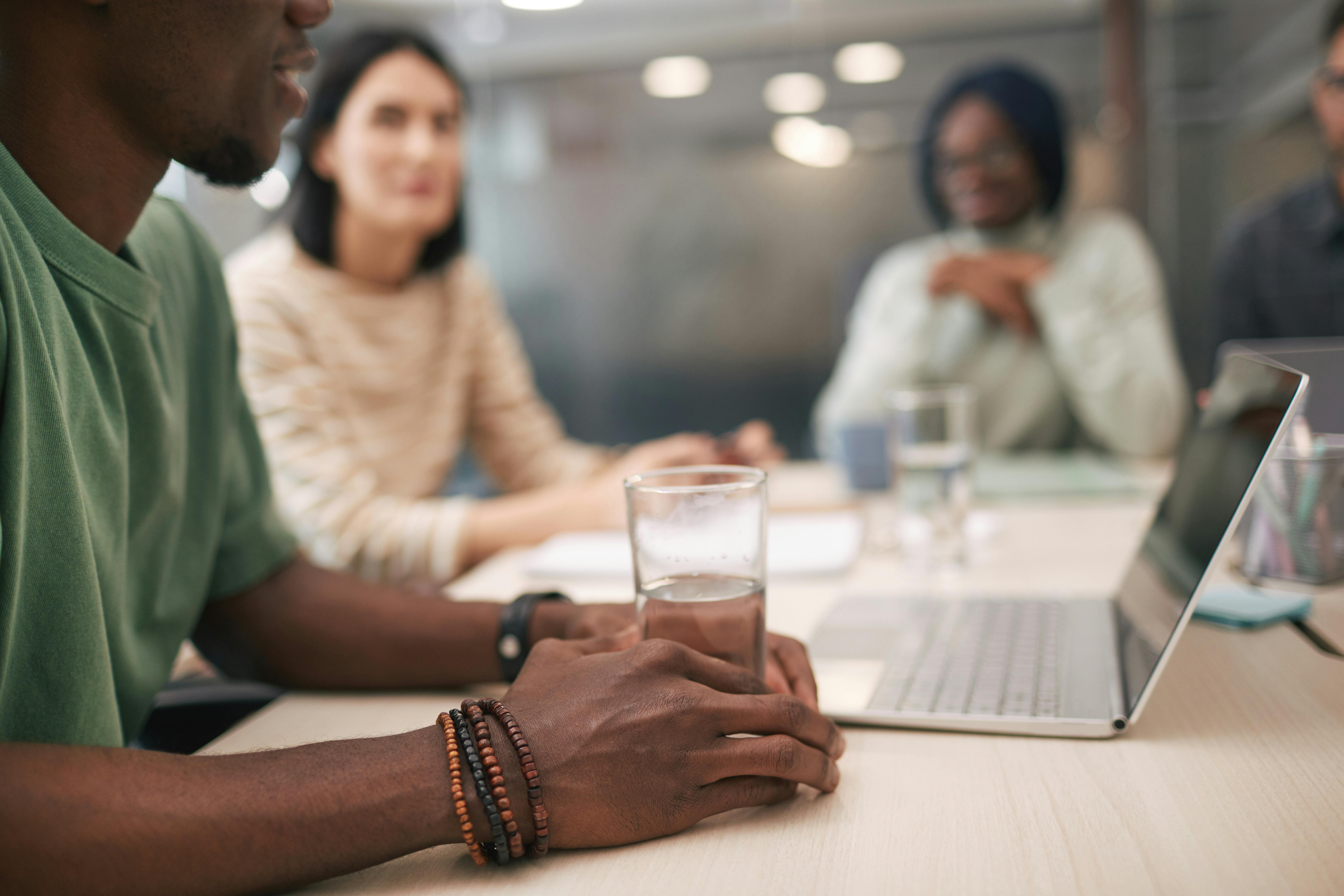 Photo Of People Sitting On Chairs · Free Stock Photo