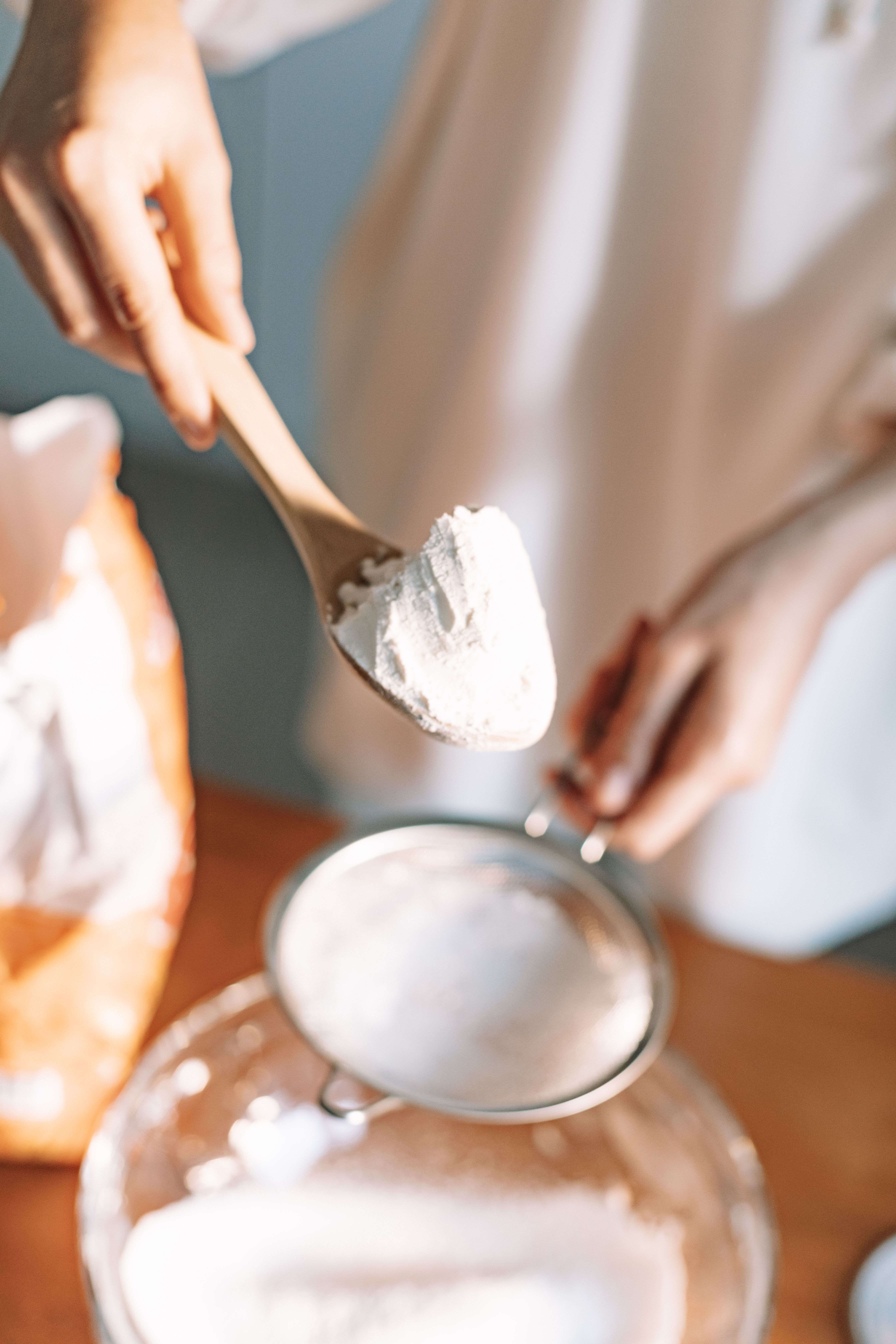 Close-up of Woman Holding Gold Powder in Hands · Free Stock Photo