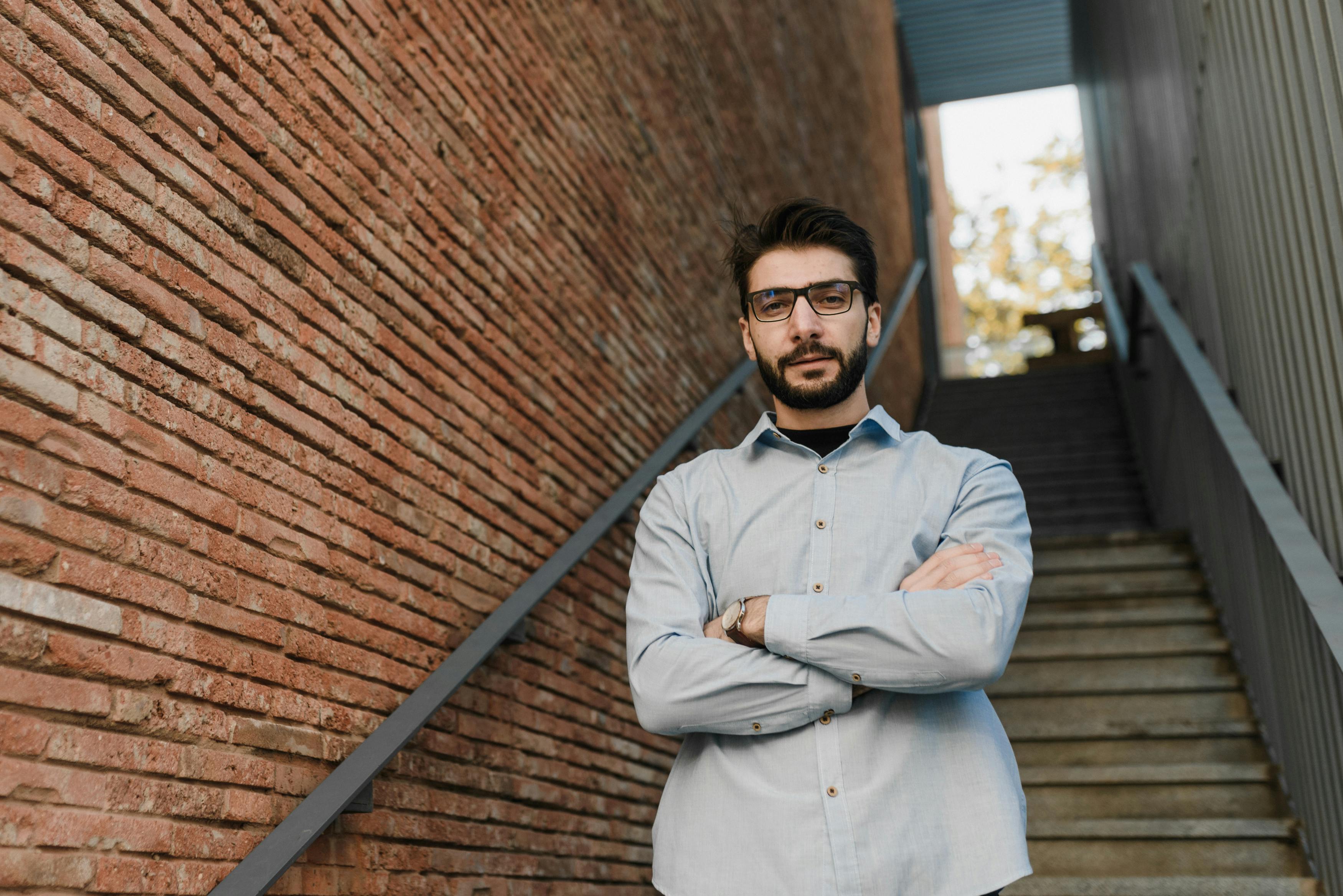 Man Standing on the Staircase · Free Stock Photo