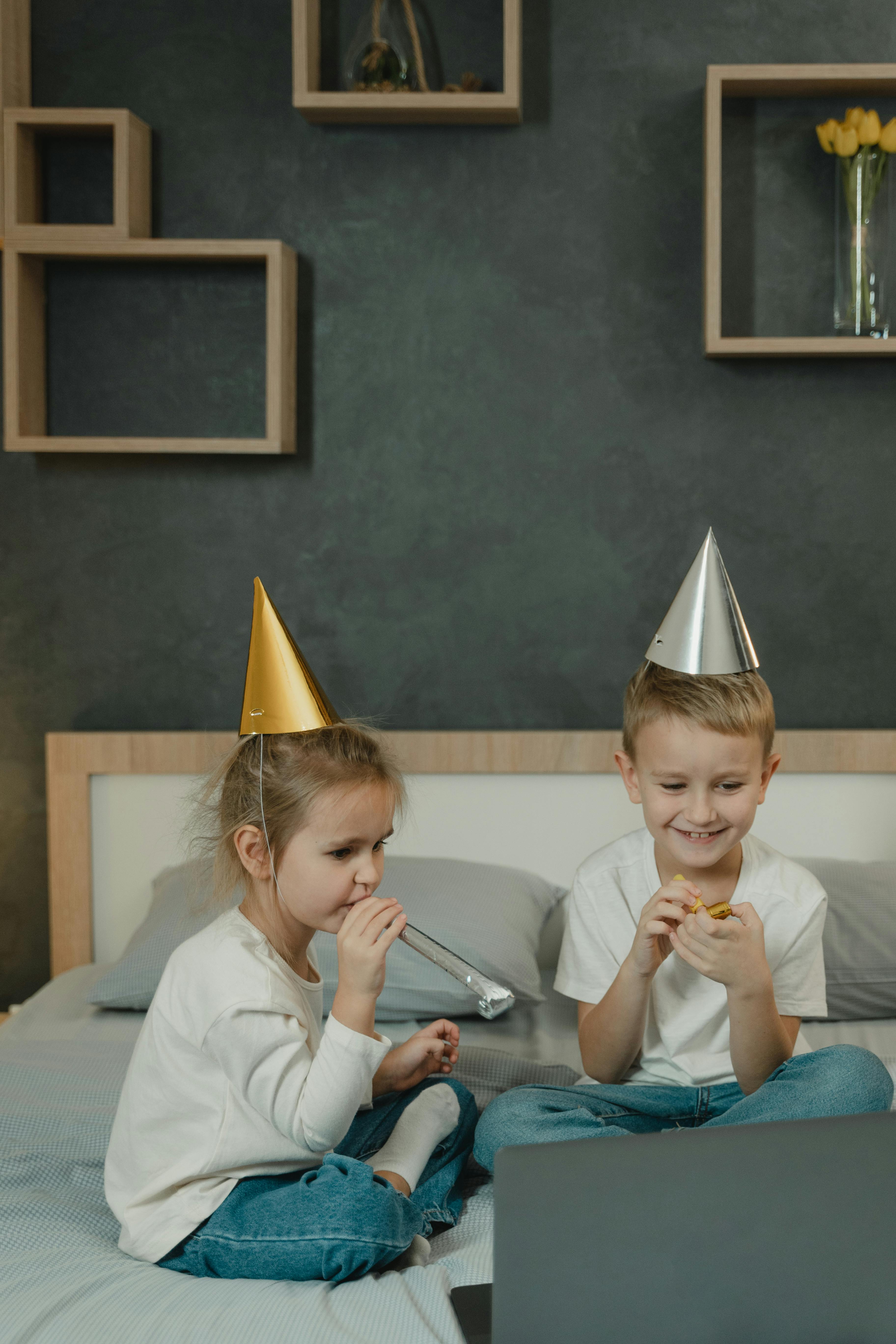 A Boy and Girl Watching on the Laptop · Free Stock Photo