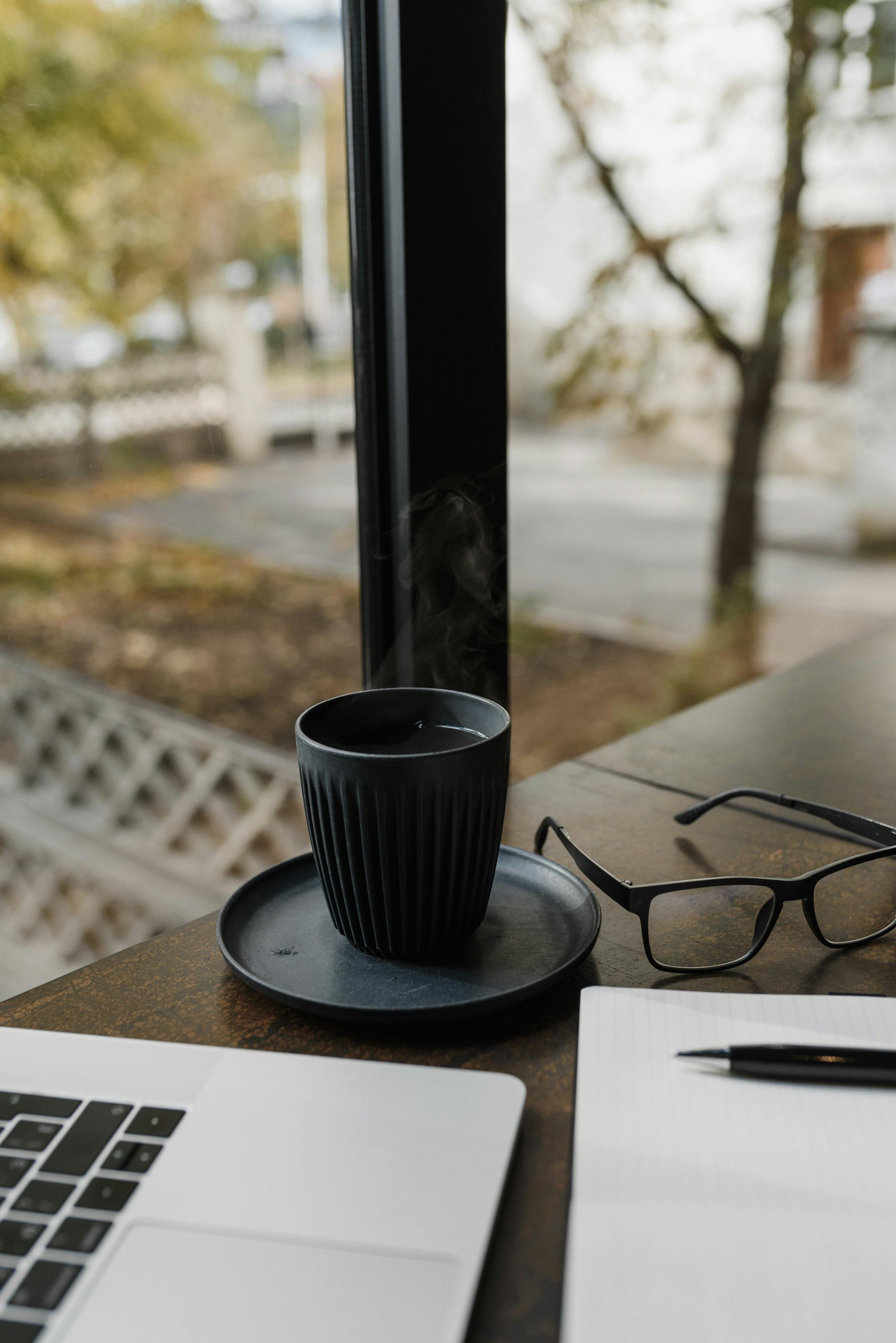 Black Ceramic Mug on the Table · Free Stock Photo
