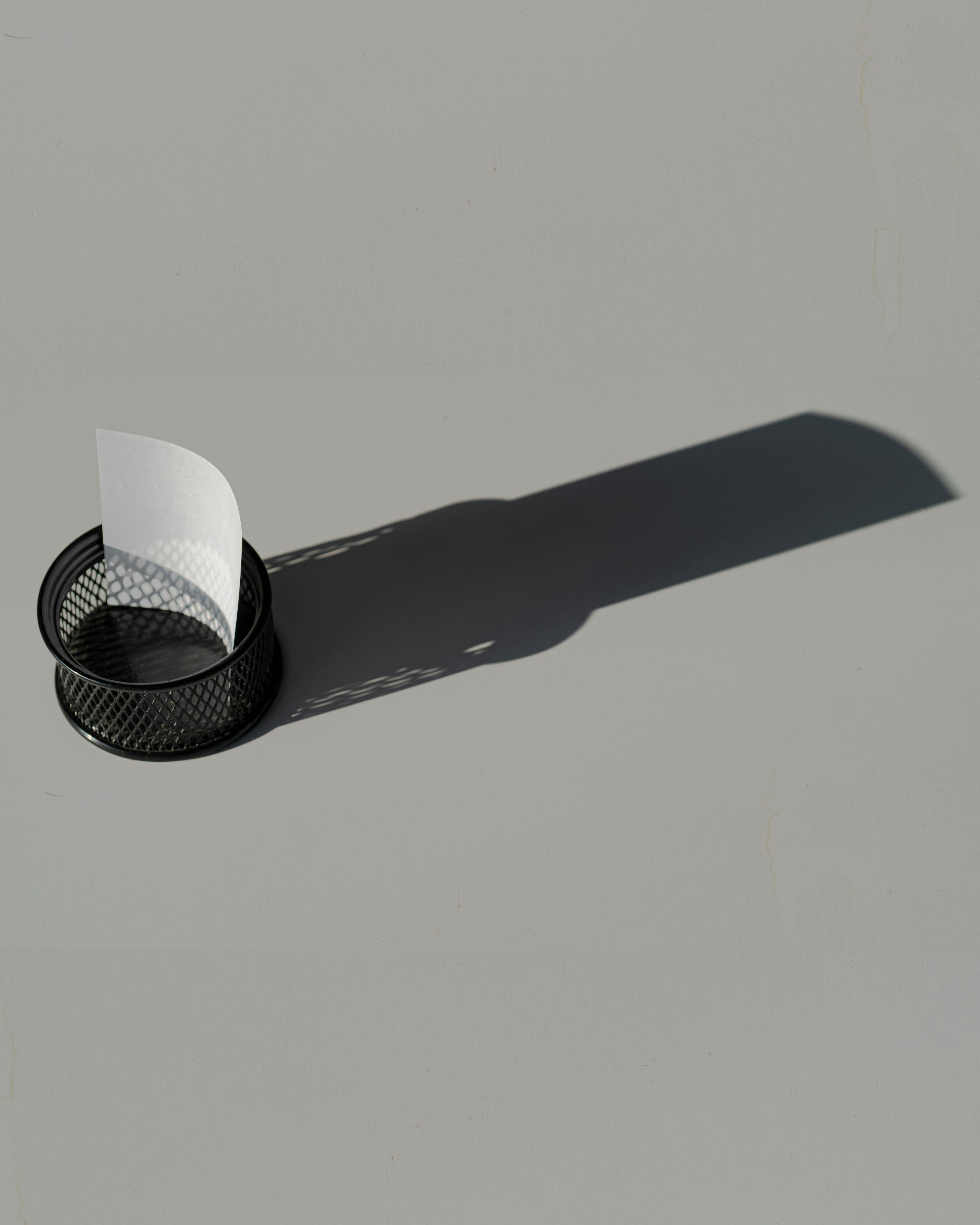 Metal Mesh Paper Holder with Shadow · Free Stock Photo