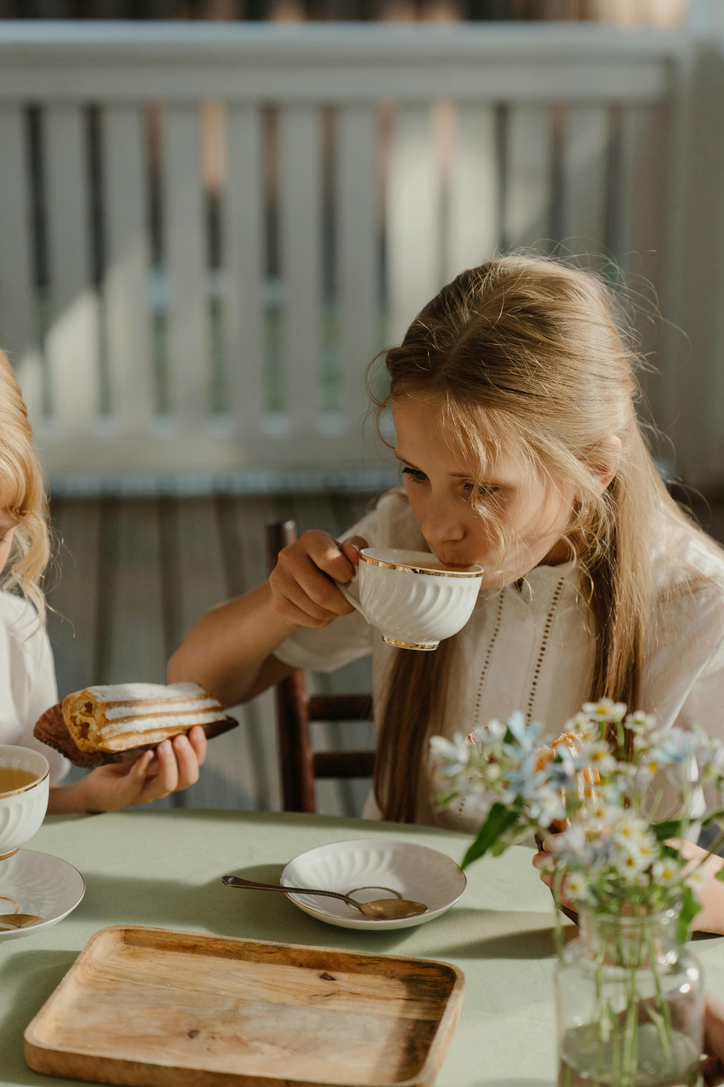 Young Girl Drinking Tea · Free Stock Photo