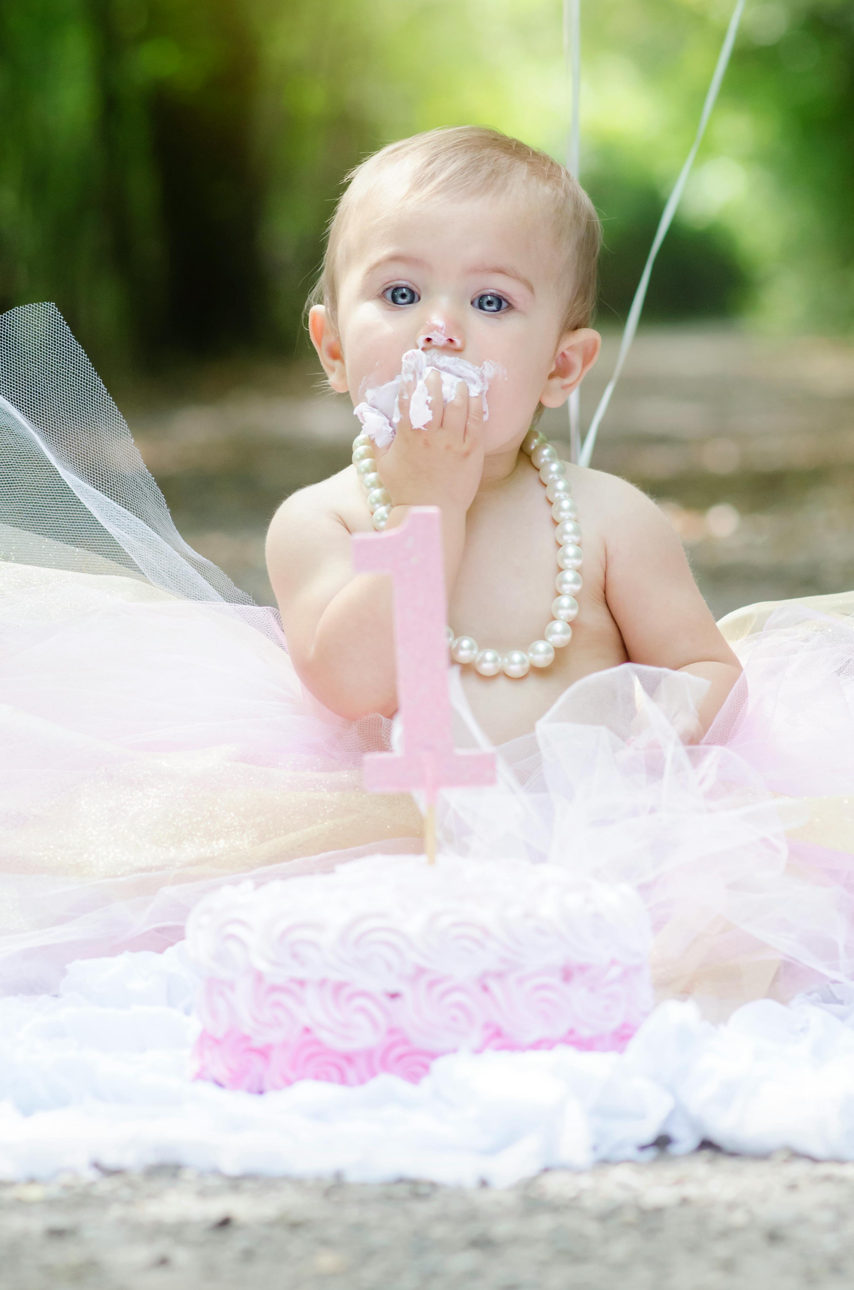 A Baby Eating a Cake · Free Stock Photo