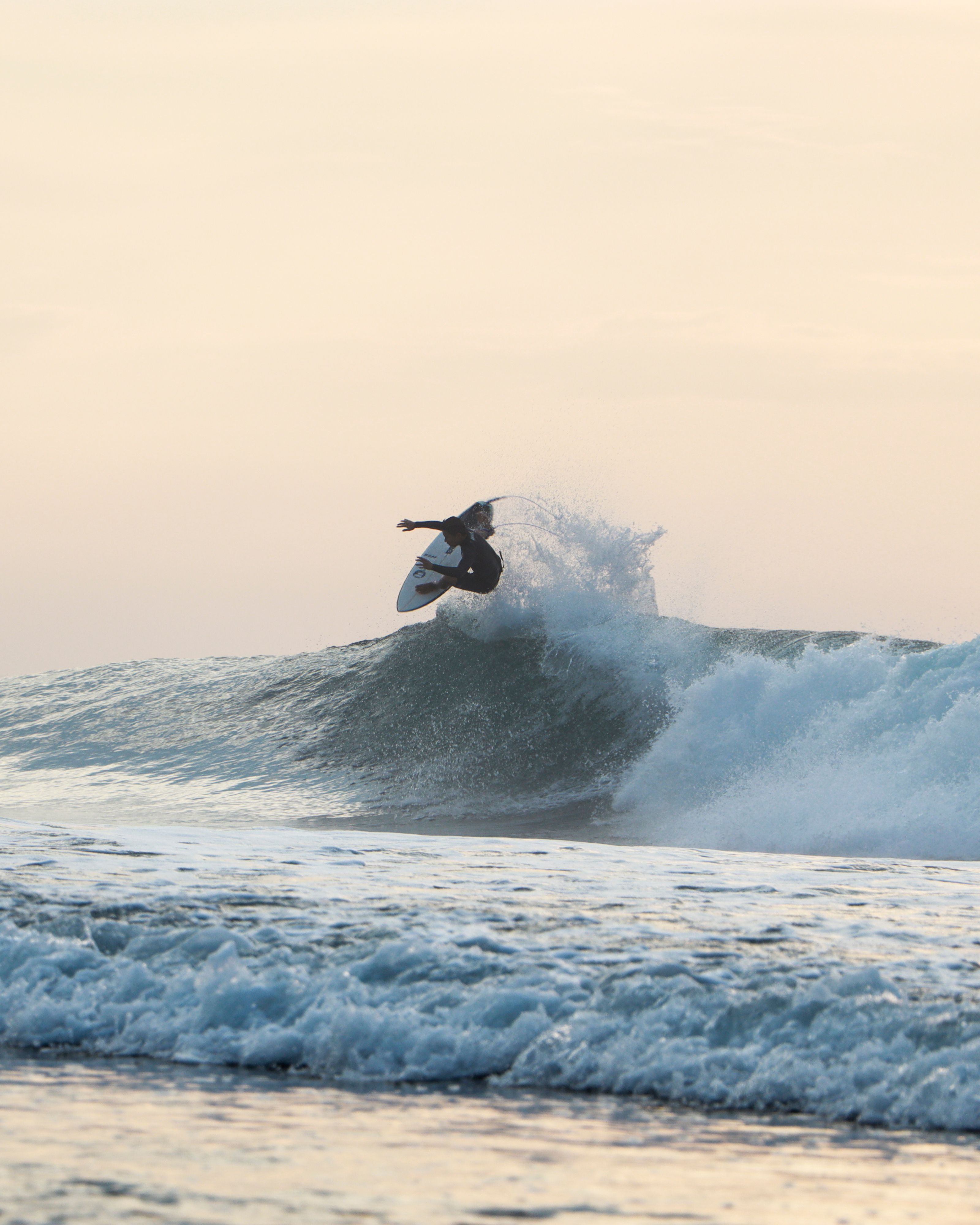 Person Surfing on Sea Waves · Free Stock Photo
