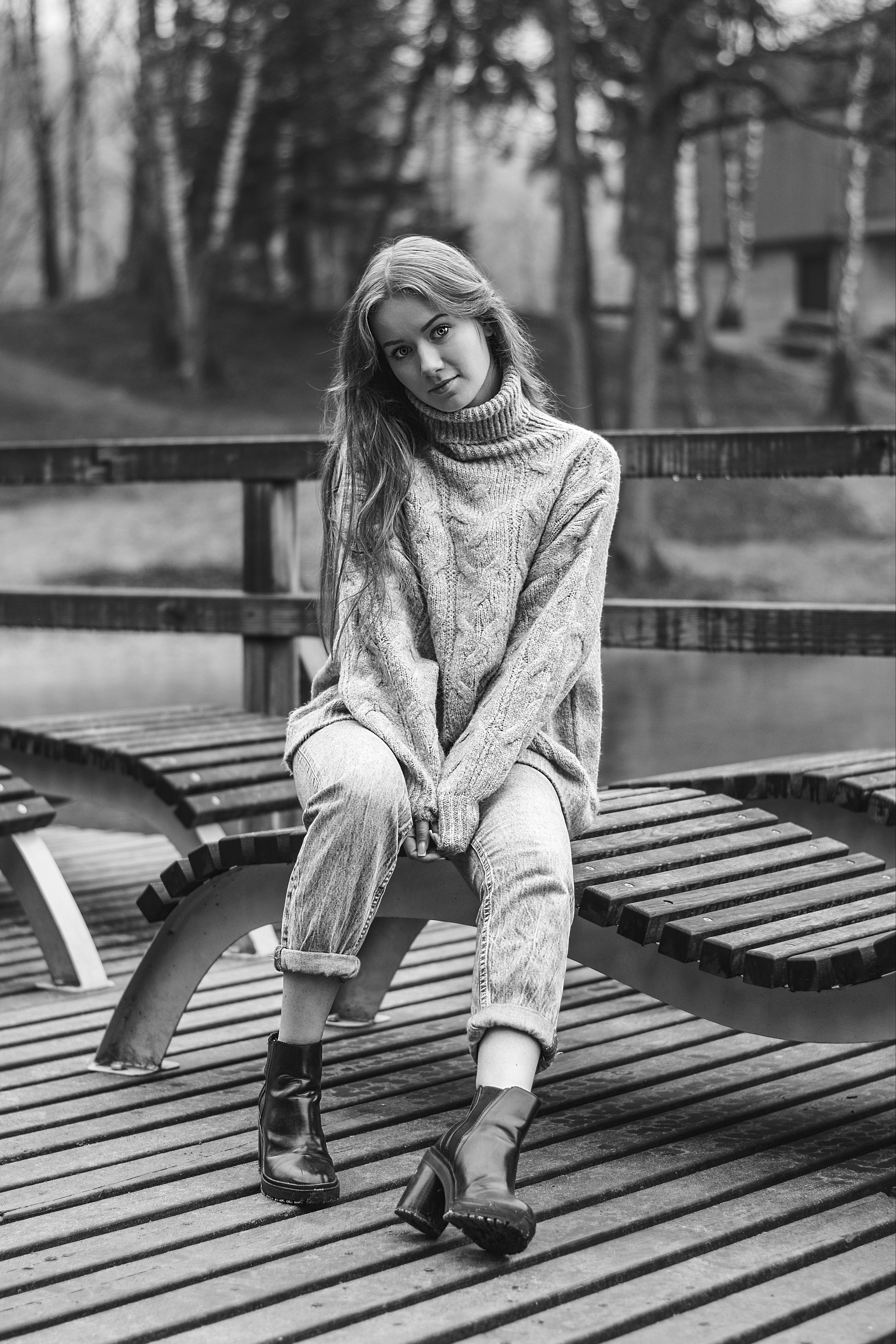 Woman in Sweater Sitting on Bench · Free Stock Photo
