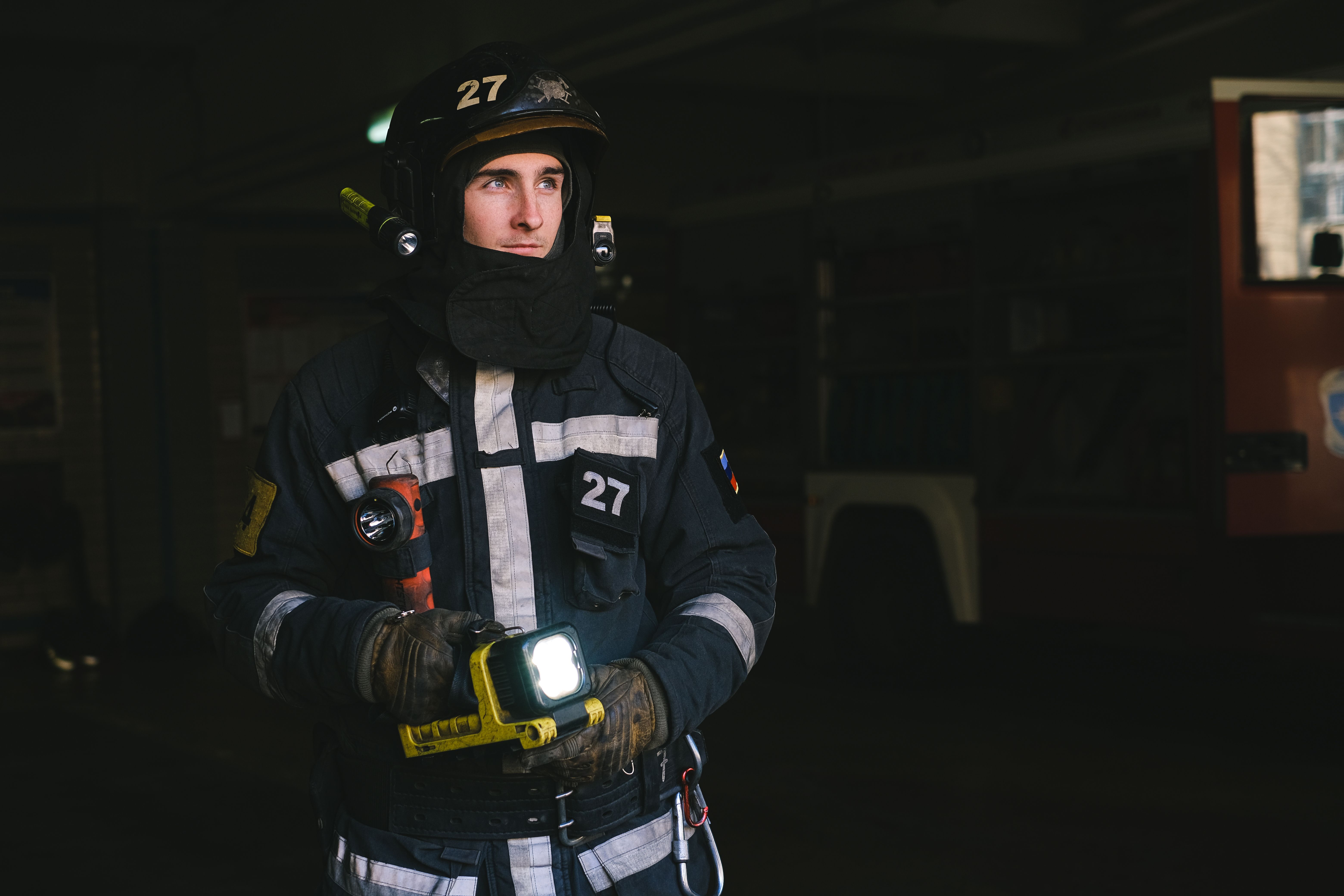 Fireman Holding Fire Hose · Free Stock Photo
