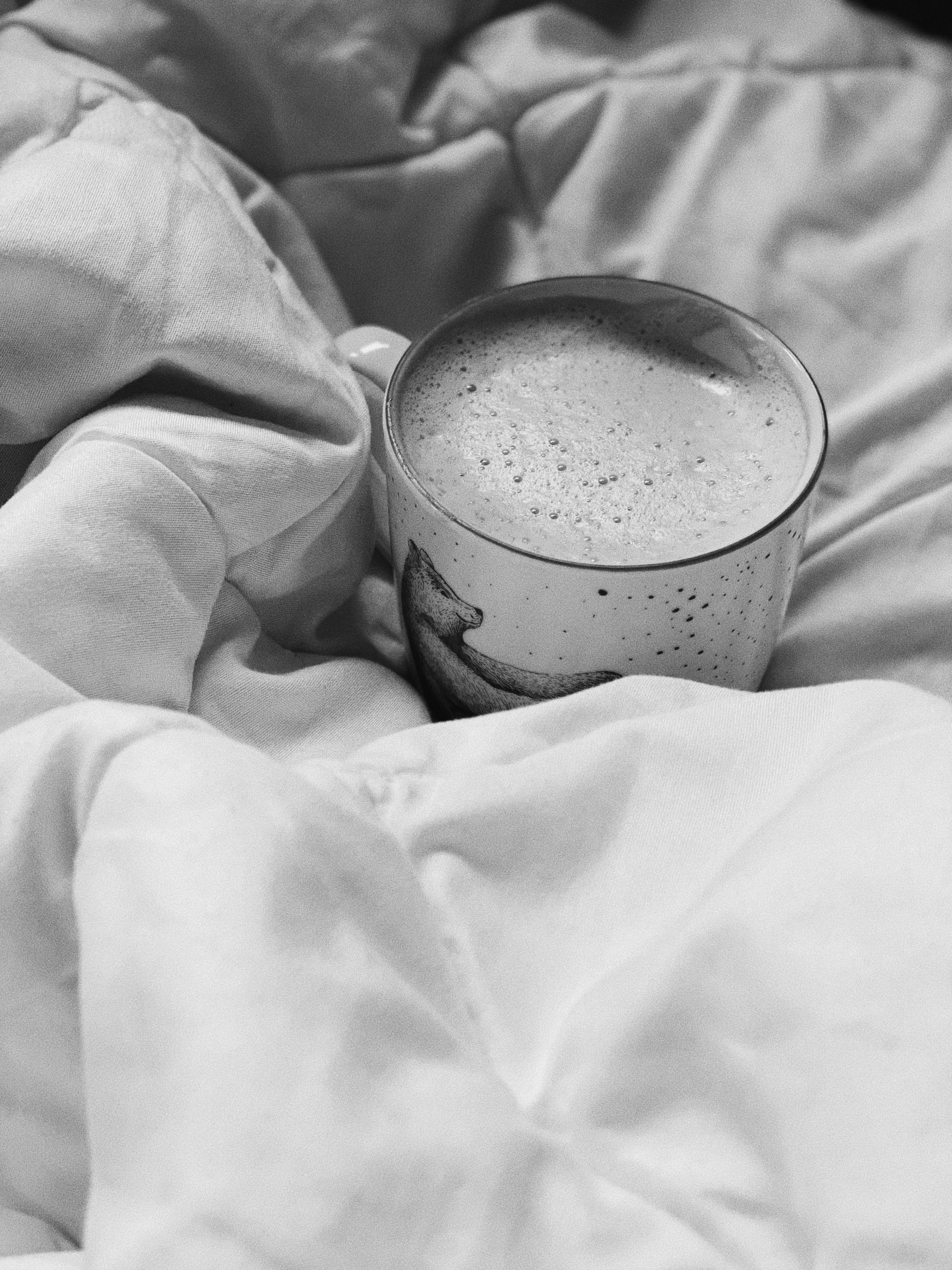 Grayscale Photo of a Cup of Coffee · Free Stock Photo