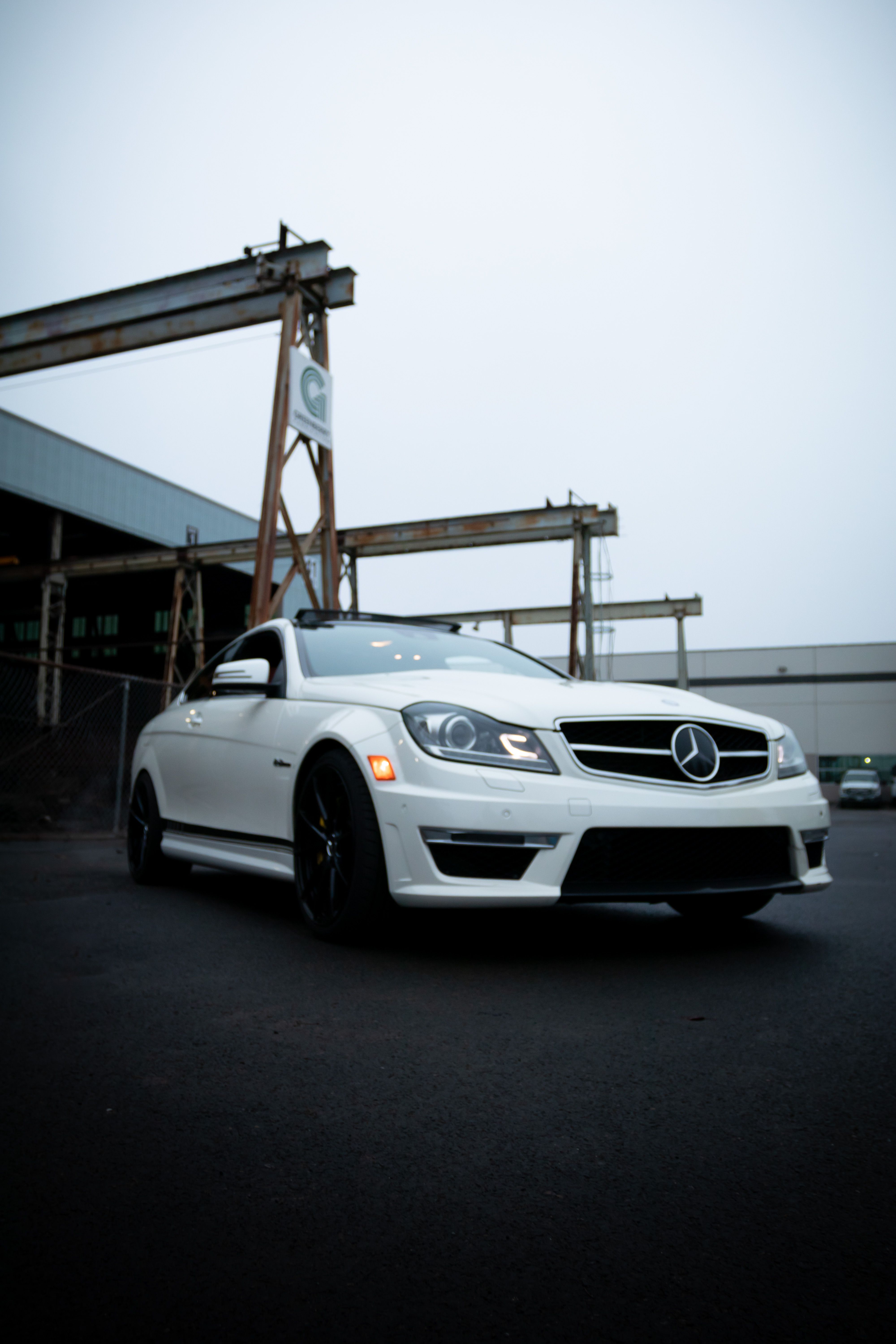 White Car Parked on the Parking Area · Free Stock Photo