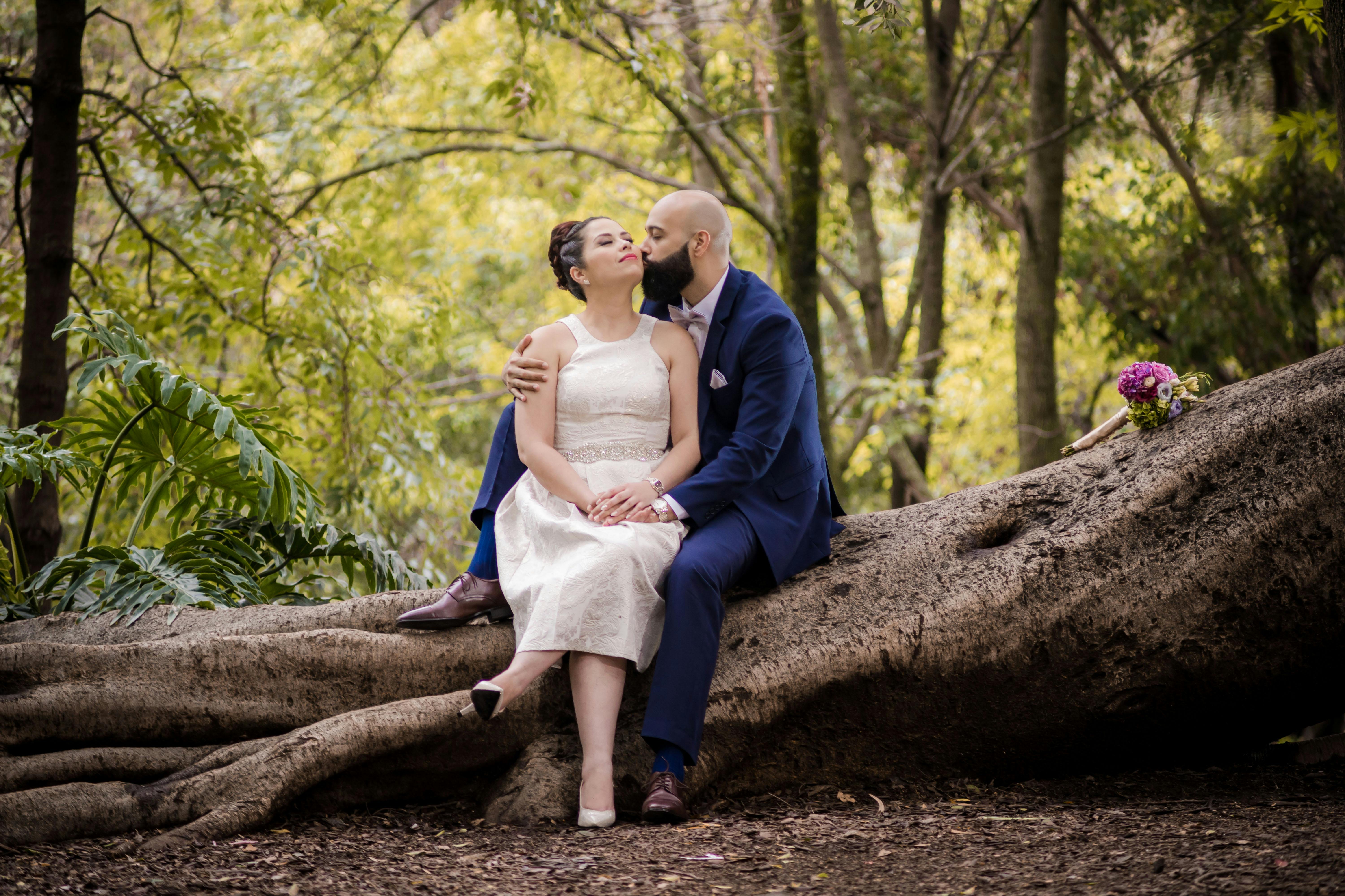 Groom Kissing Bride Neck · Free Stock Photo