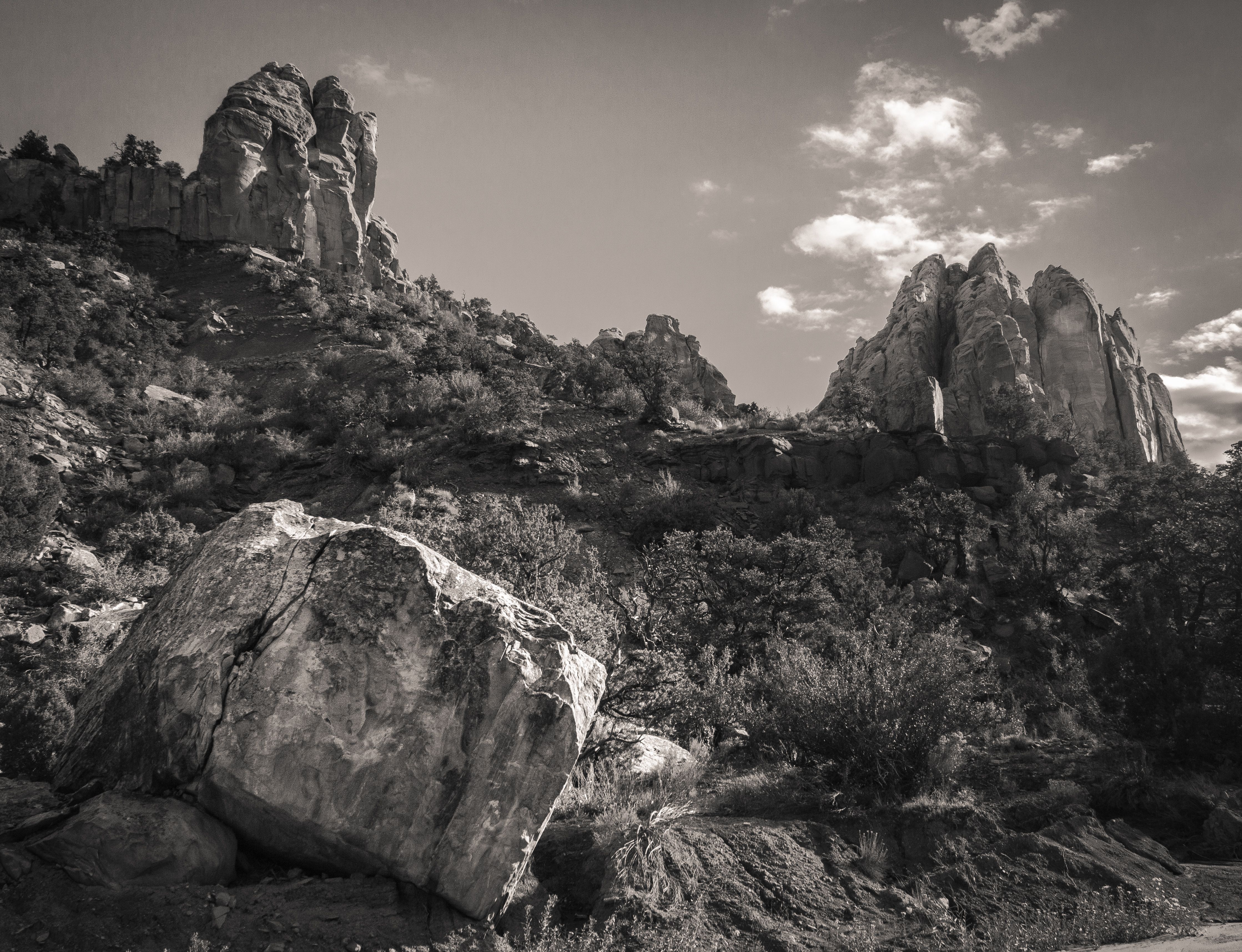 Grayscale Photo of a Rock Formation · Free Stock Photo