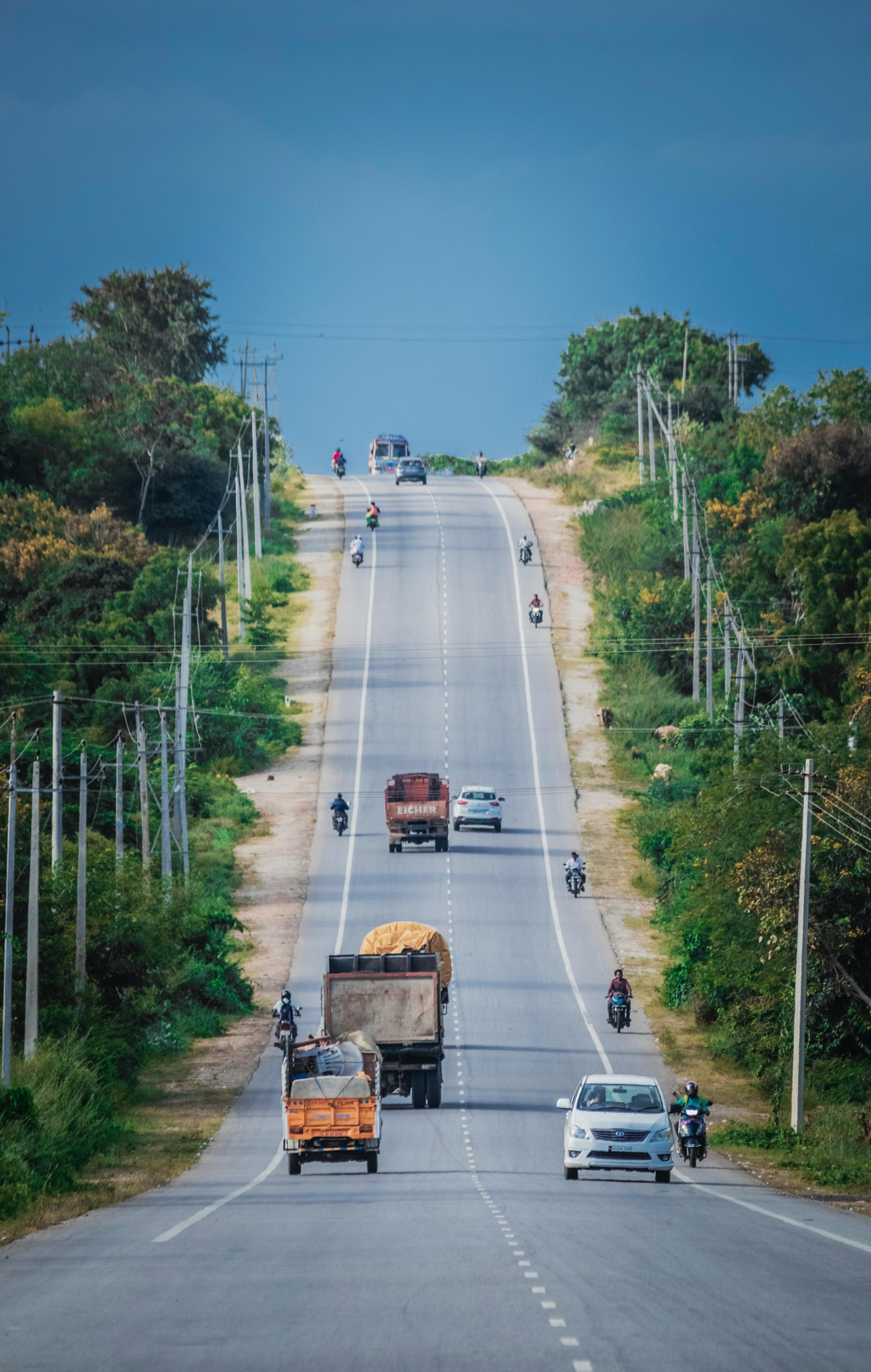 Vehicles on an Uphill Road · Free Stock Photo
