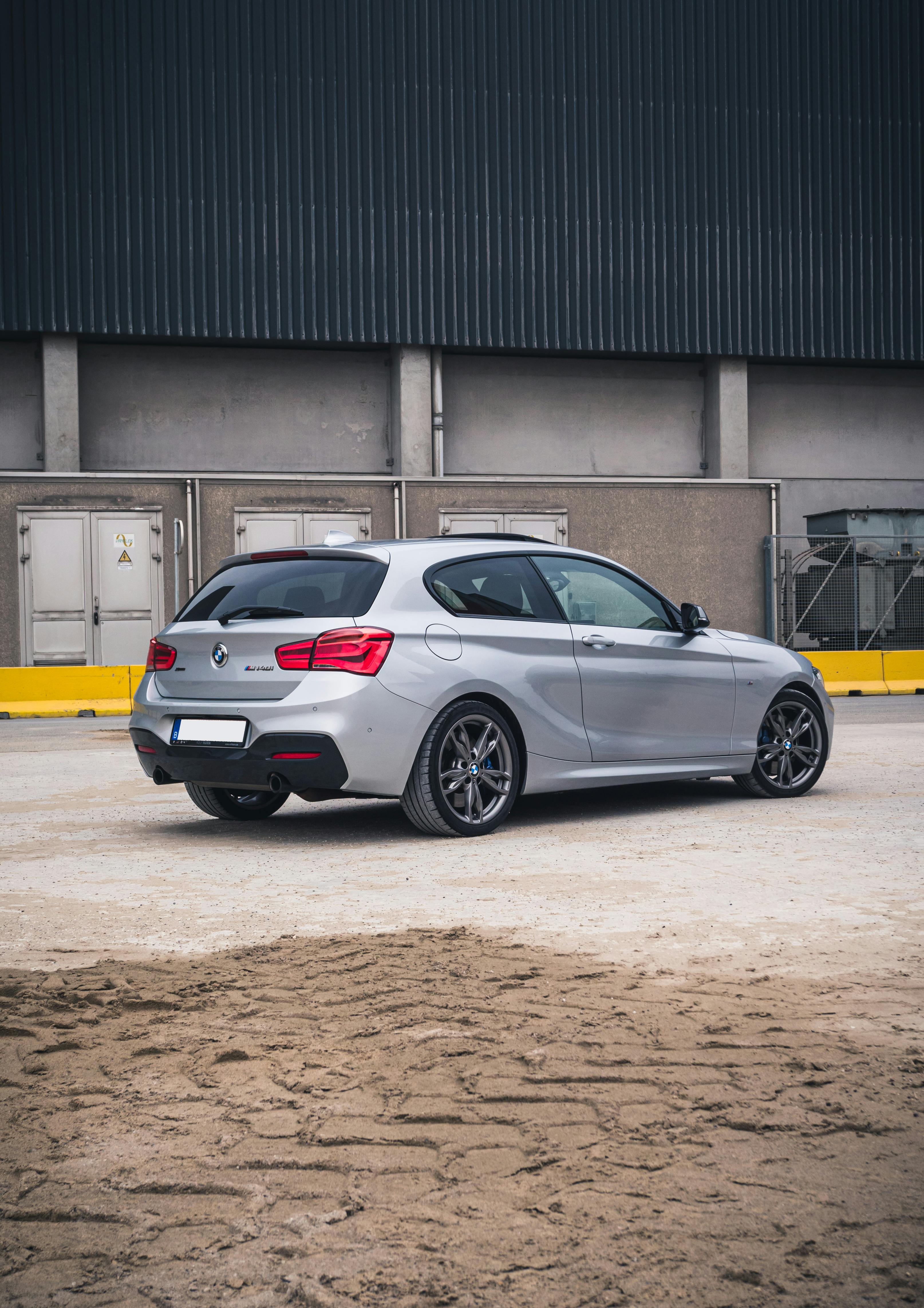 Silver Hatchback Parked on the Street · Free Stock Photo