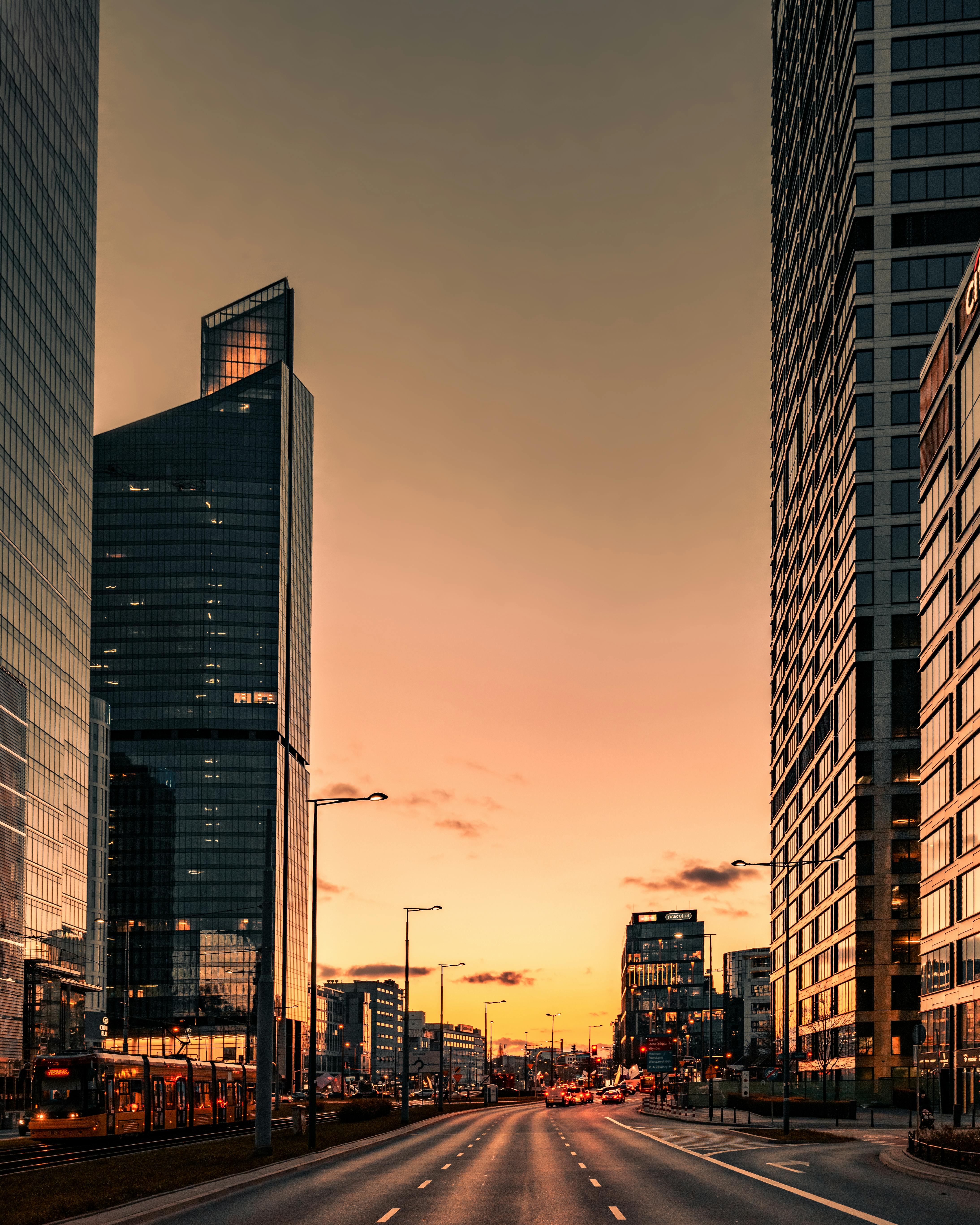 Roadway between City Buildings · Free Stock Photo