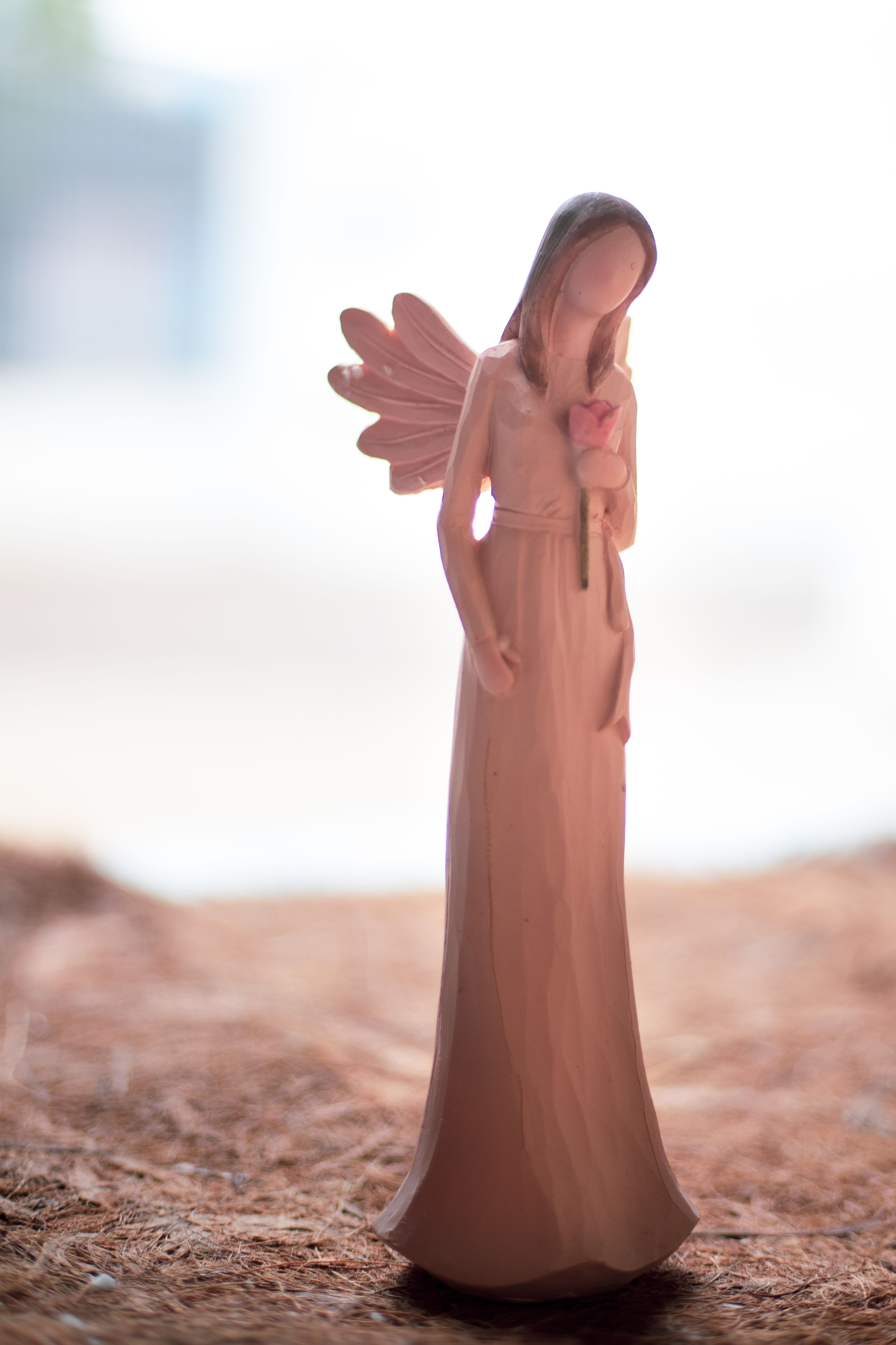 White Angel Ceramic Figurine · Free Stock Photo