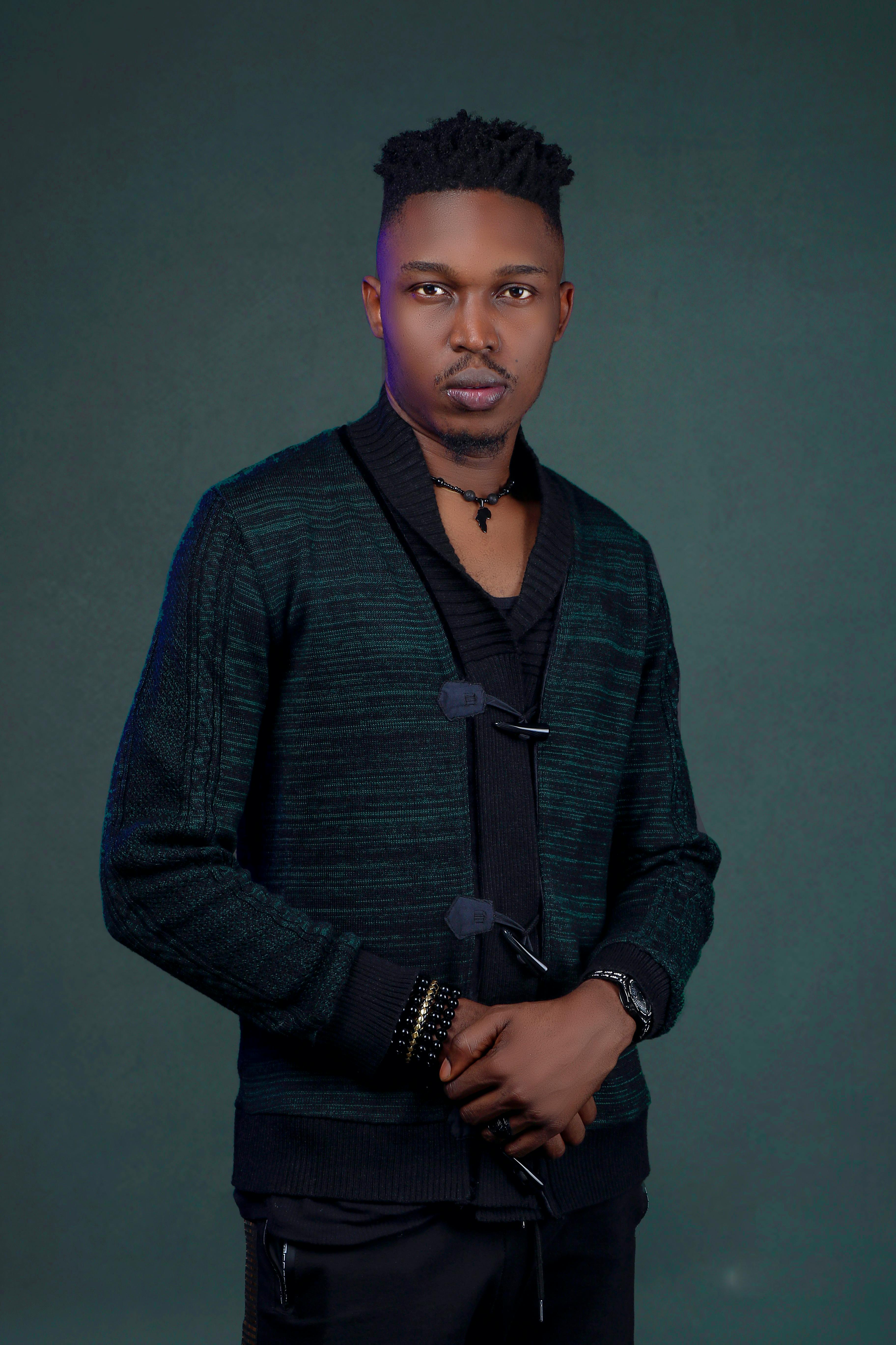 Portrait of Man Posing on Studio Background · Free Stock Photo