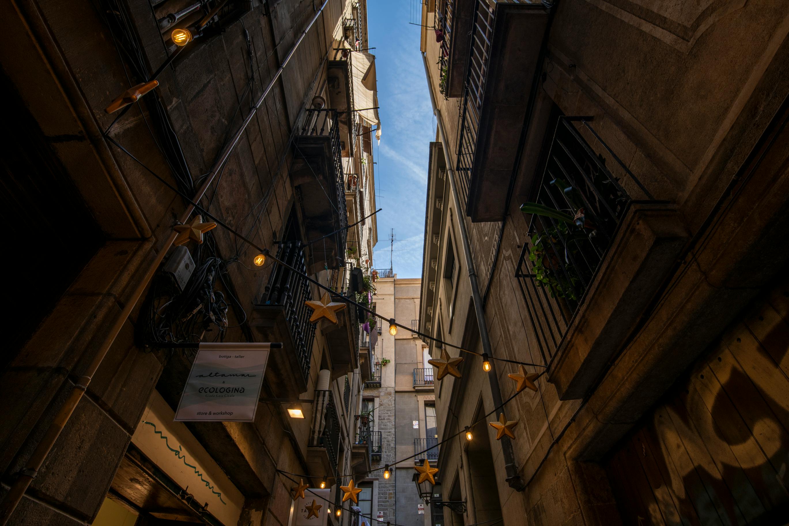 A View of Tall Buildings from an Alley · Free Stock Photo