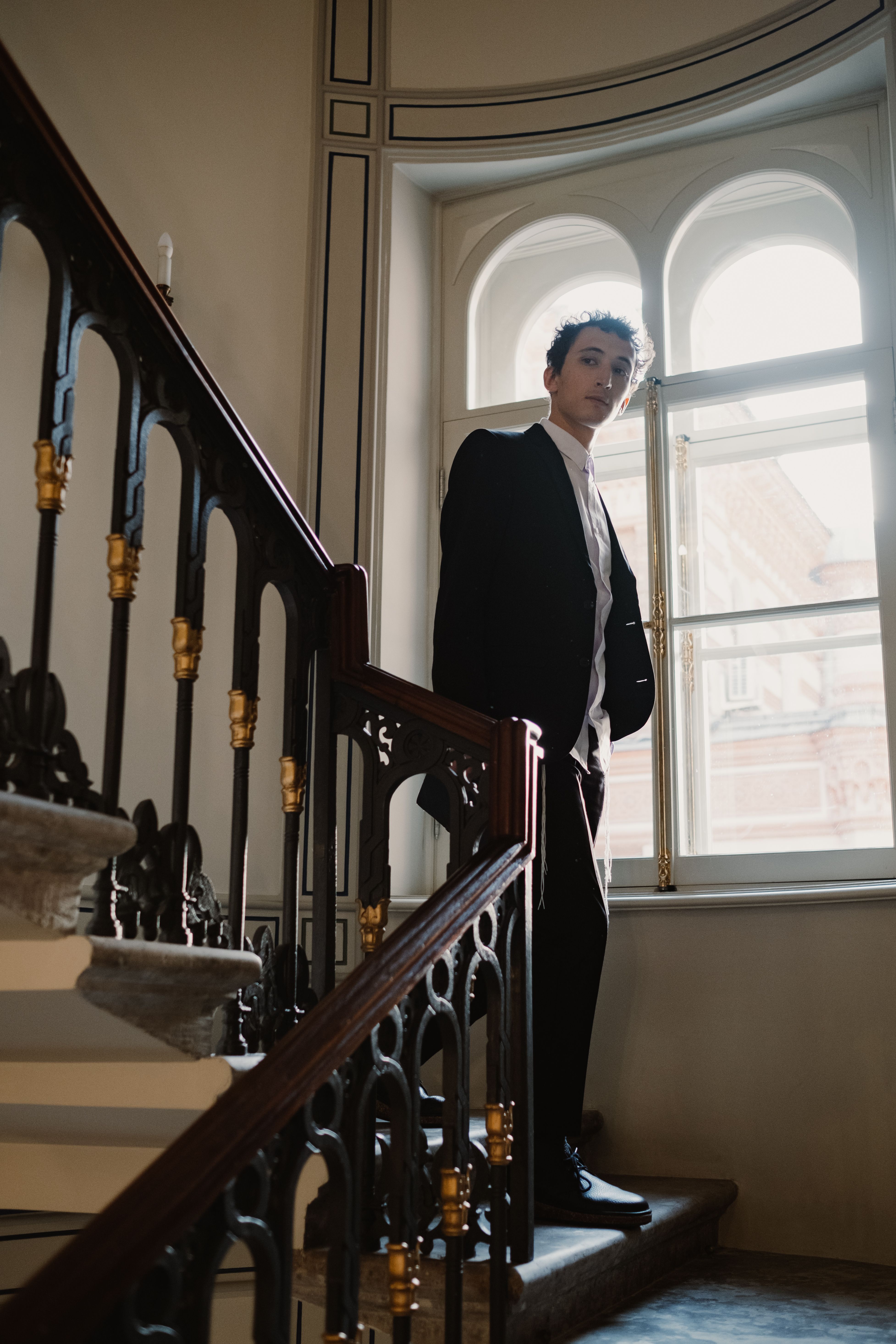 Man Walking down the Stairs · Free Stock Photo