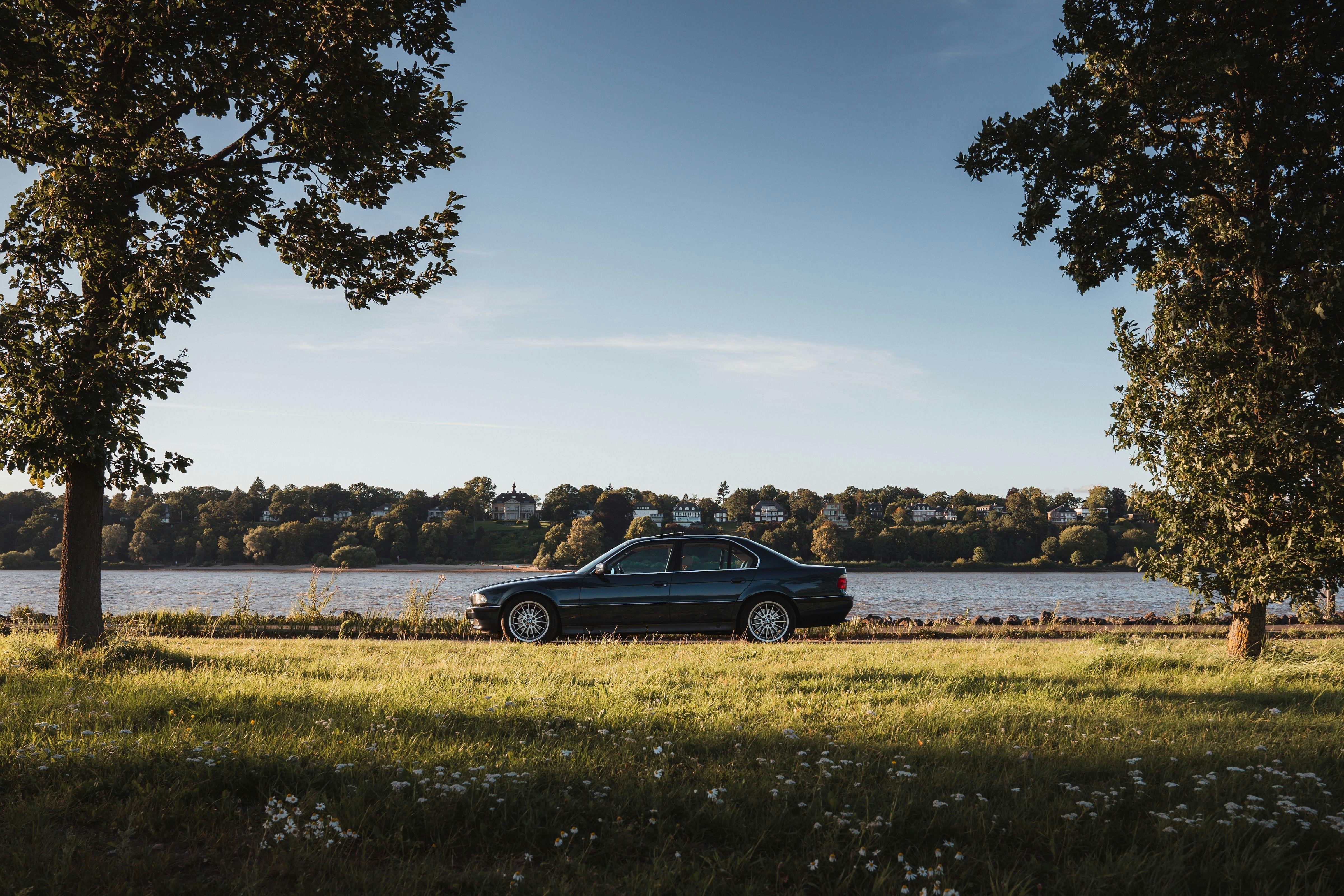 Car by River · Free Stock Photo