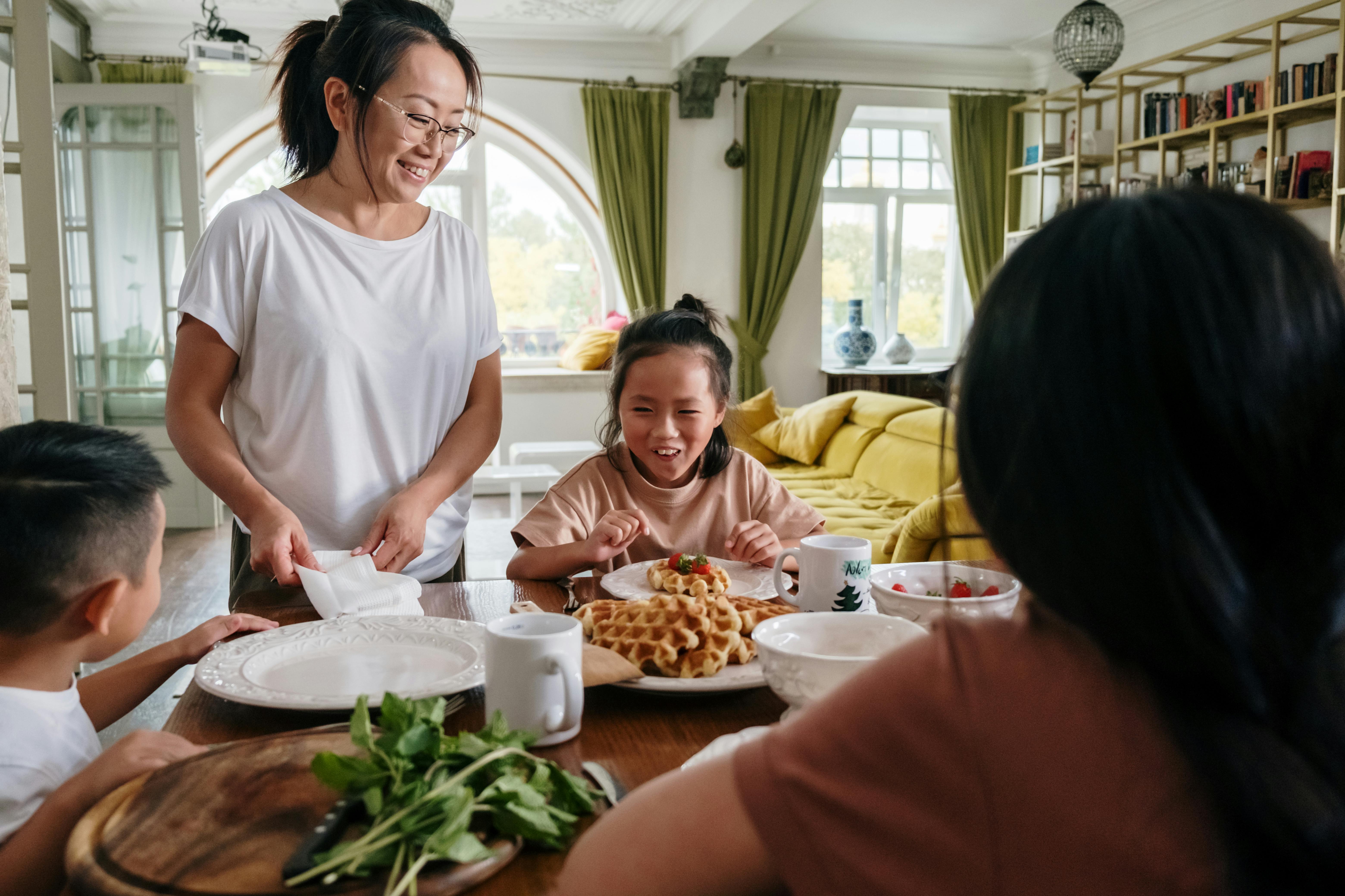 Family Eating Fresh Waffles Together · Free Stock Photo