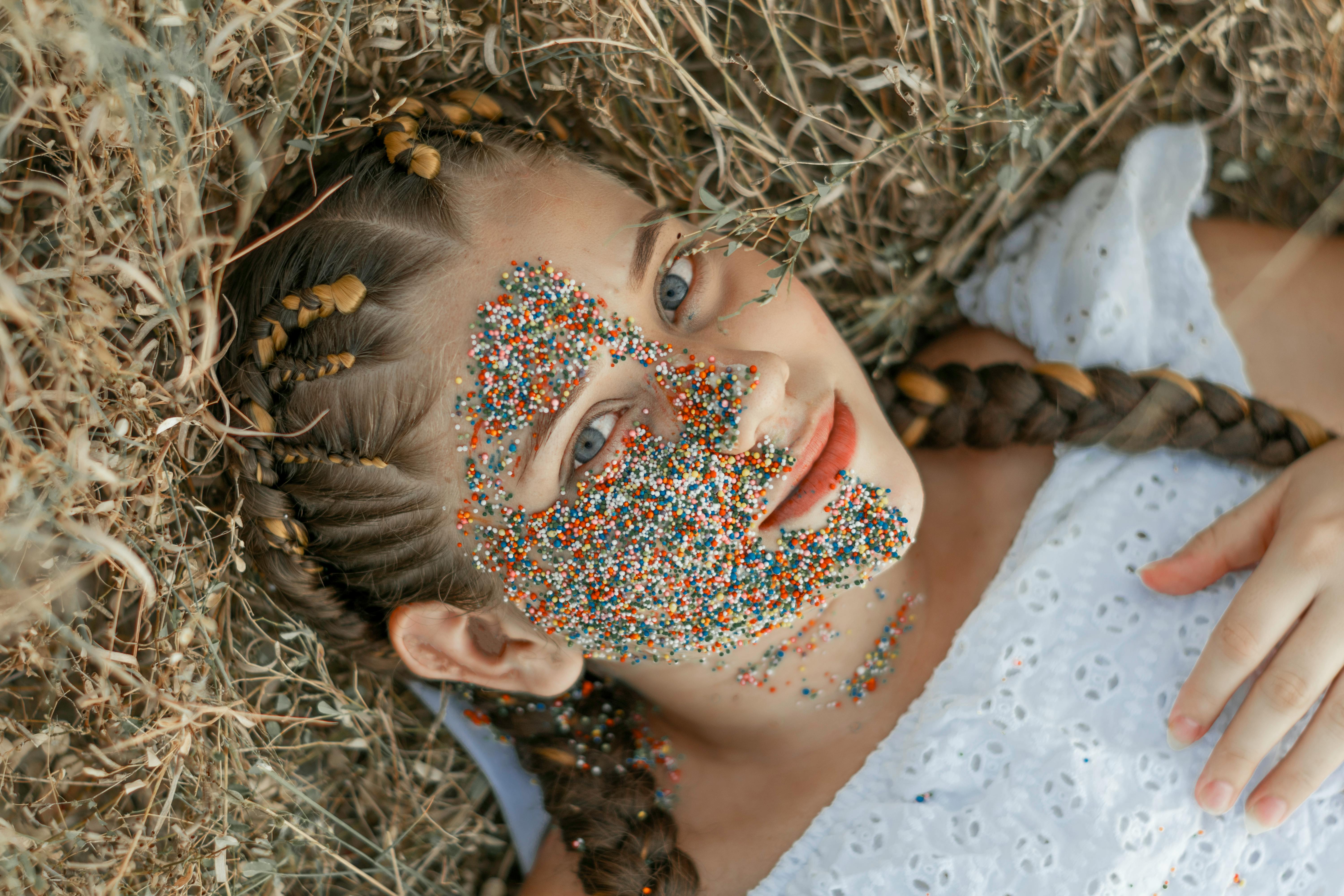 Girl with Sprinkles on her Face · Free Stock Photo