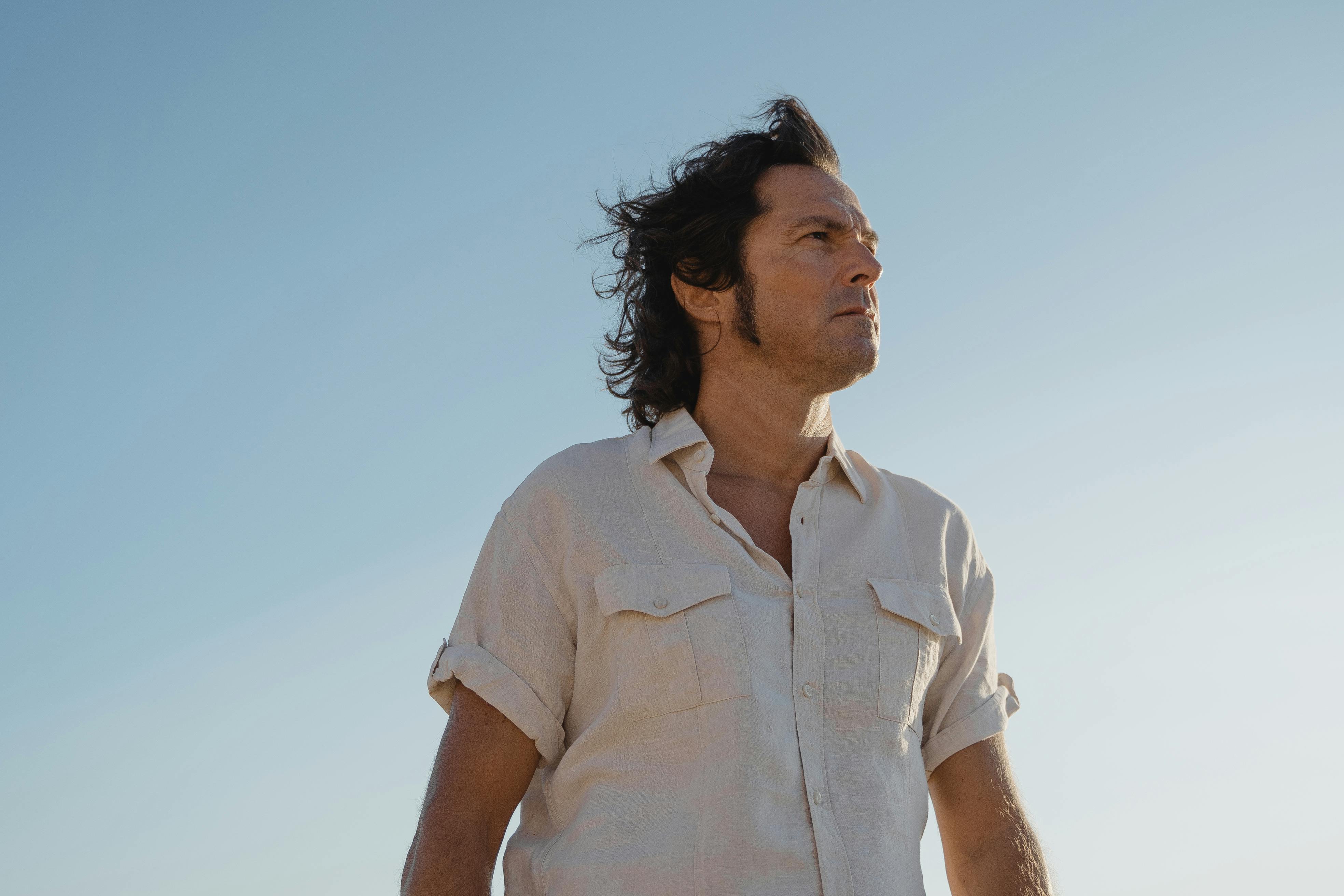 A Man in Black Headband Looking Afar · Free Stock Photo