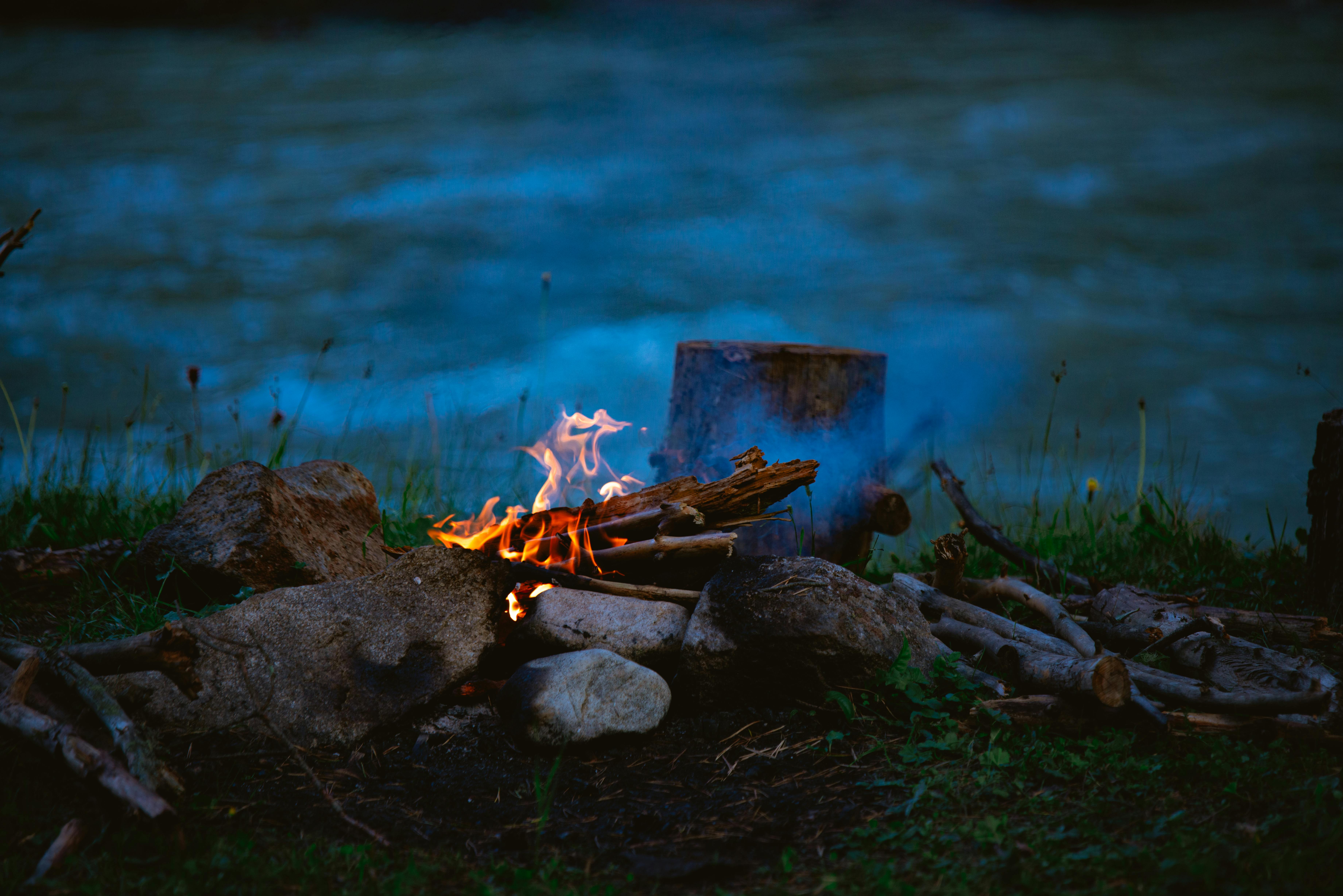 Campfire Near Body of Water · Free Stock Photo