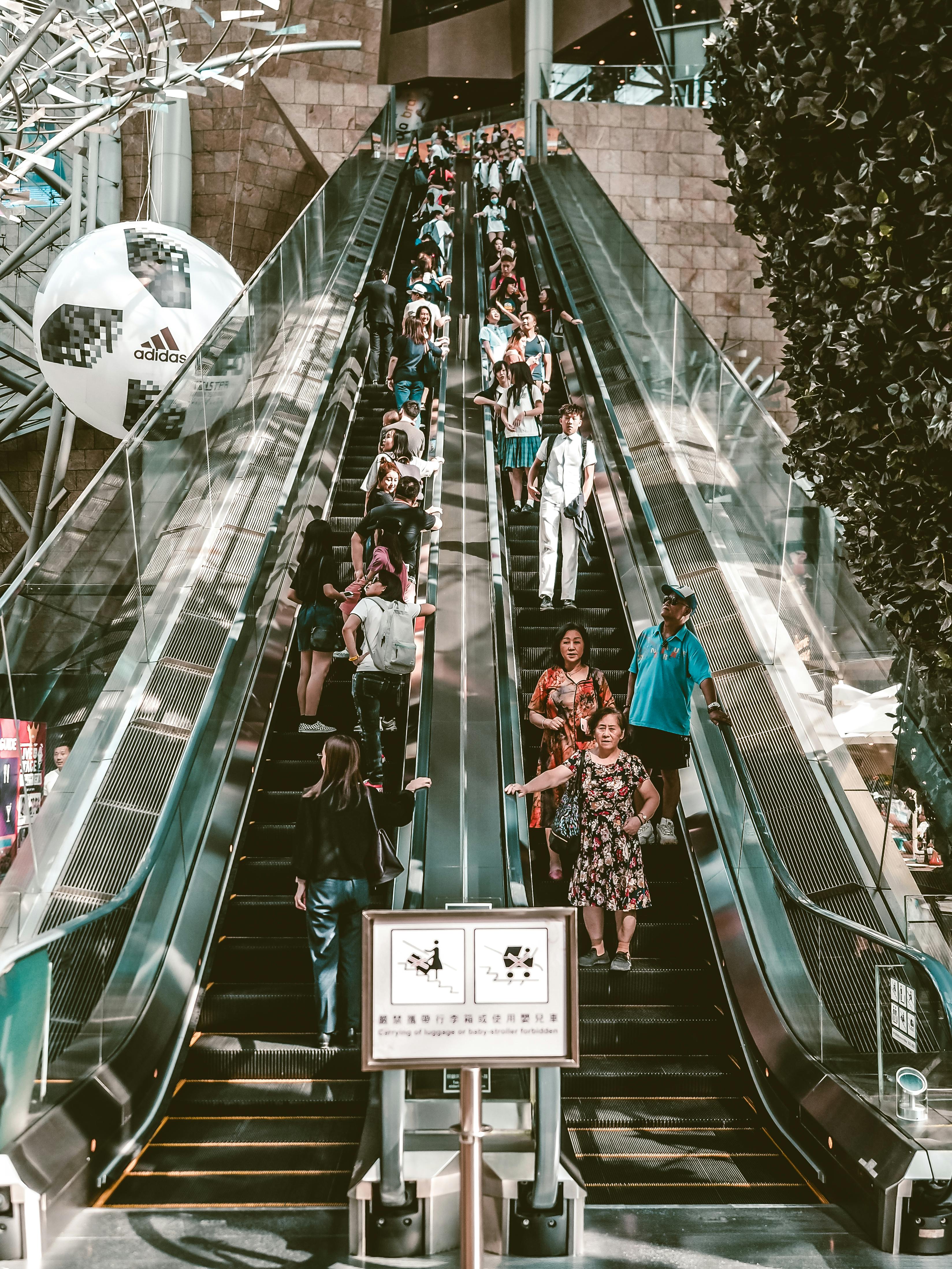 A People on the Escalator · Free Stock Photo