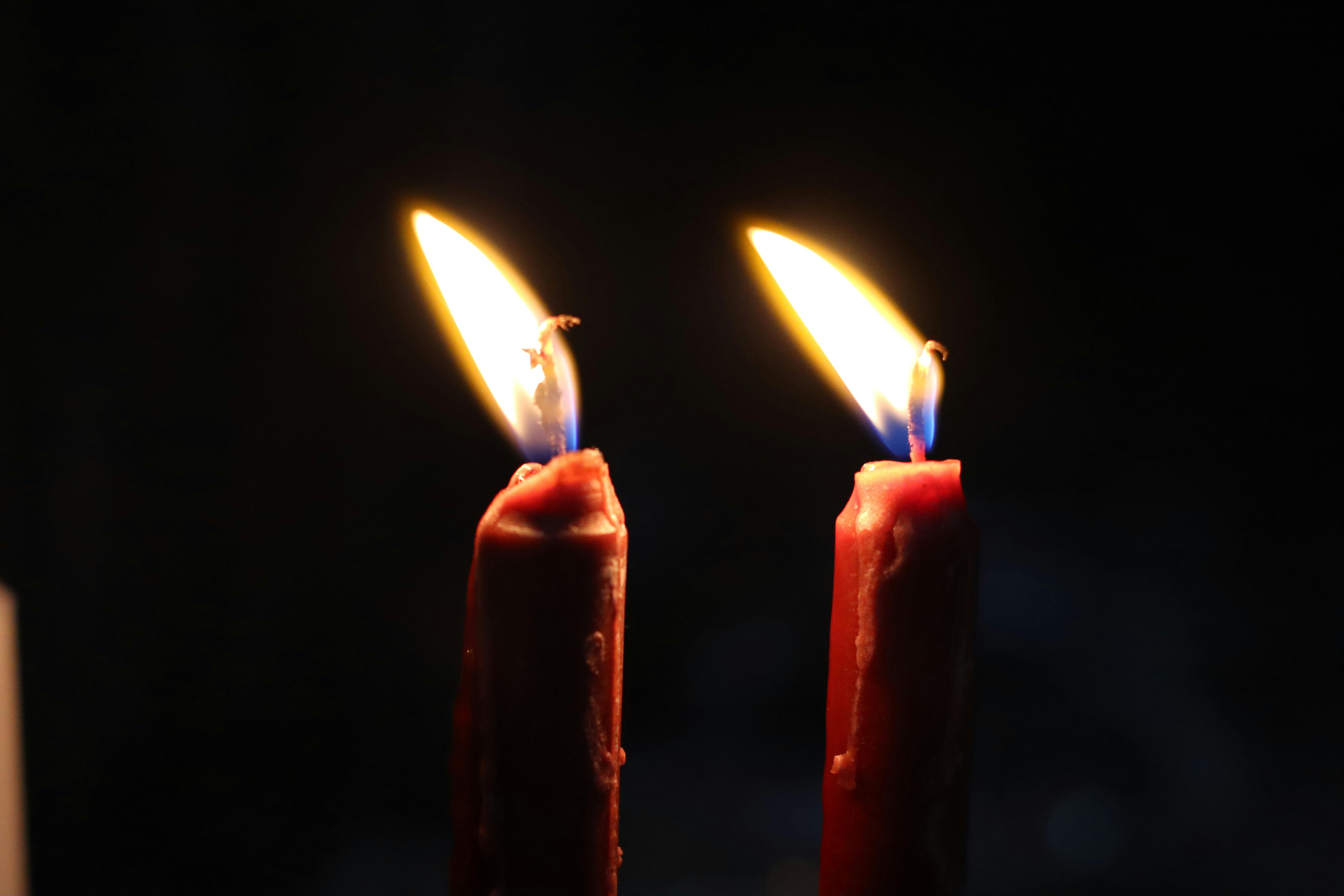 Two Red Lighted Candles · Free Stock Photo