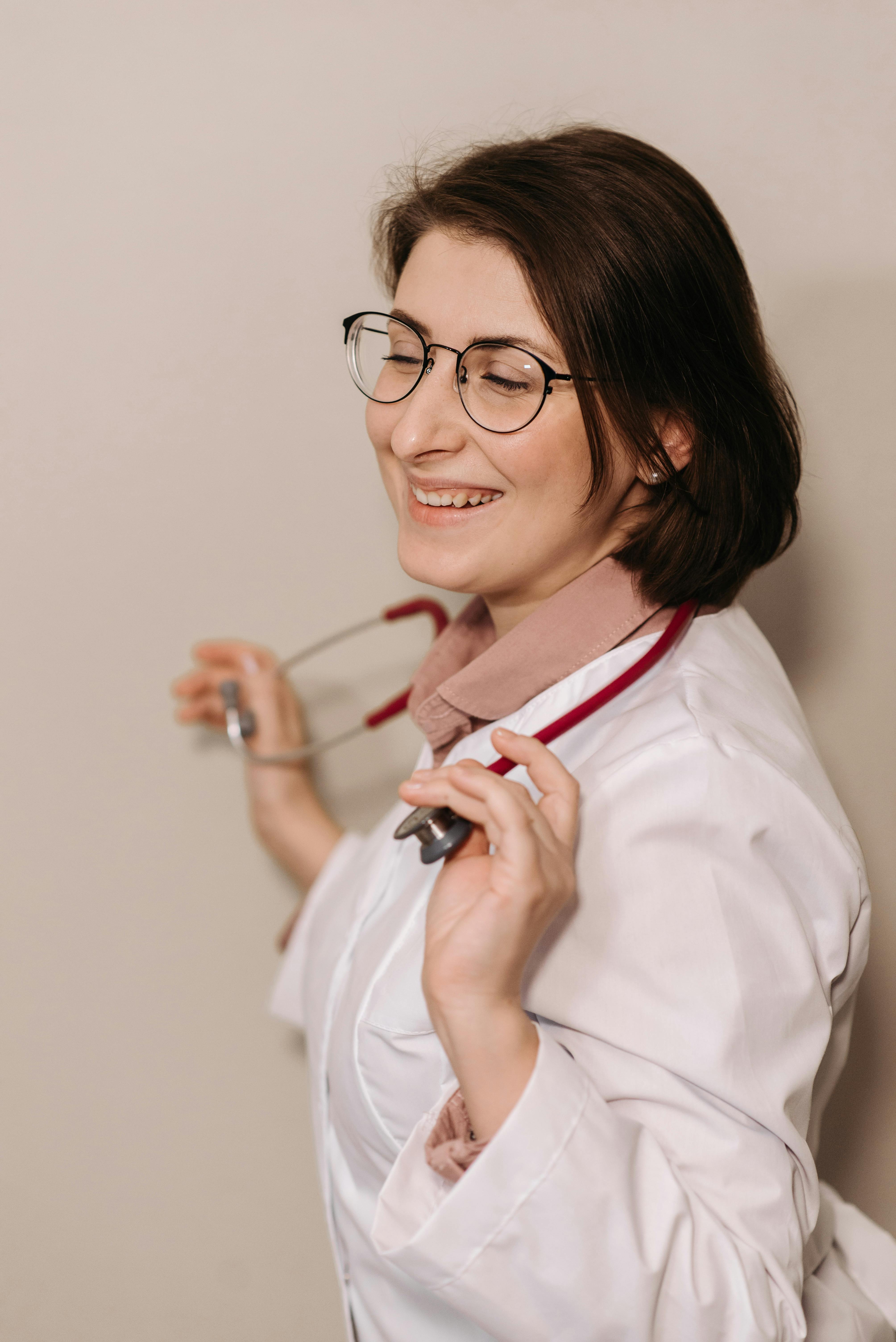 A Doctor Wearing a White Coat · Free Stock Photo