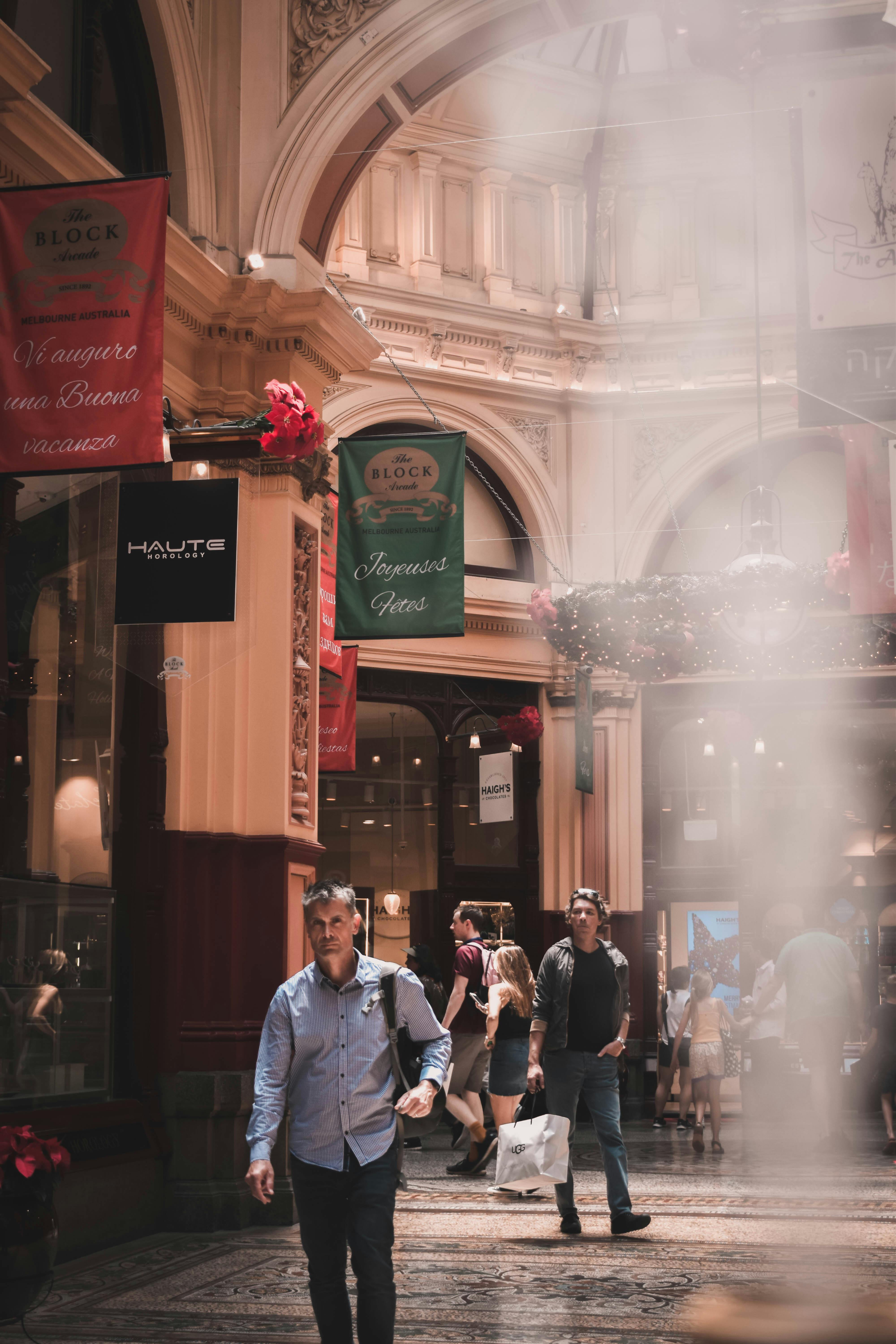 People Walking in the Hallway · Free Stock Photo