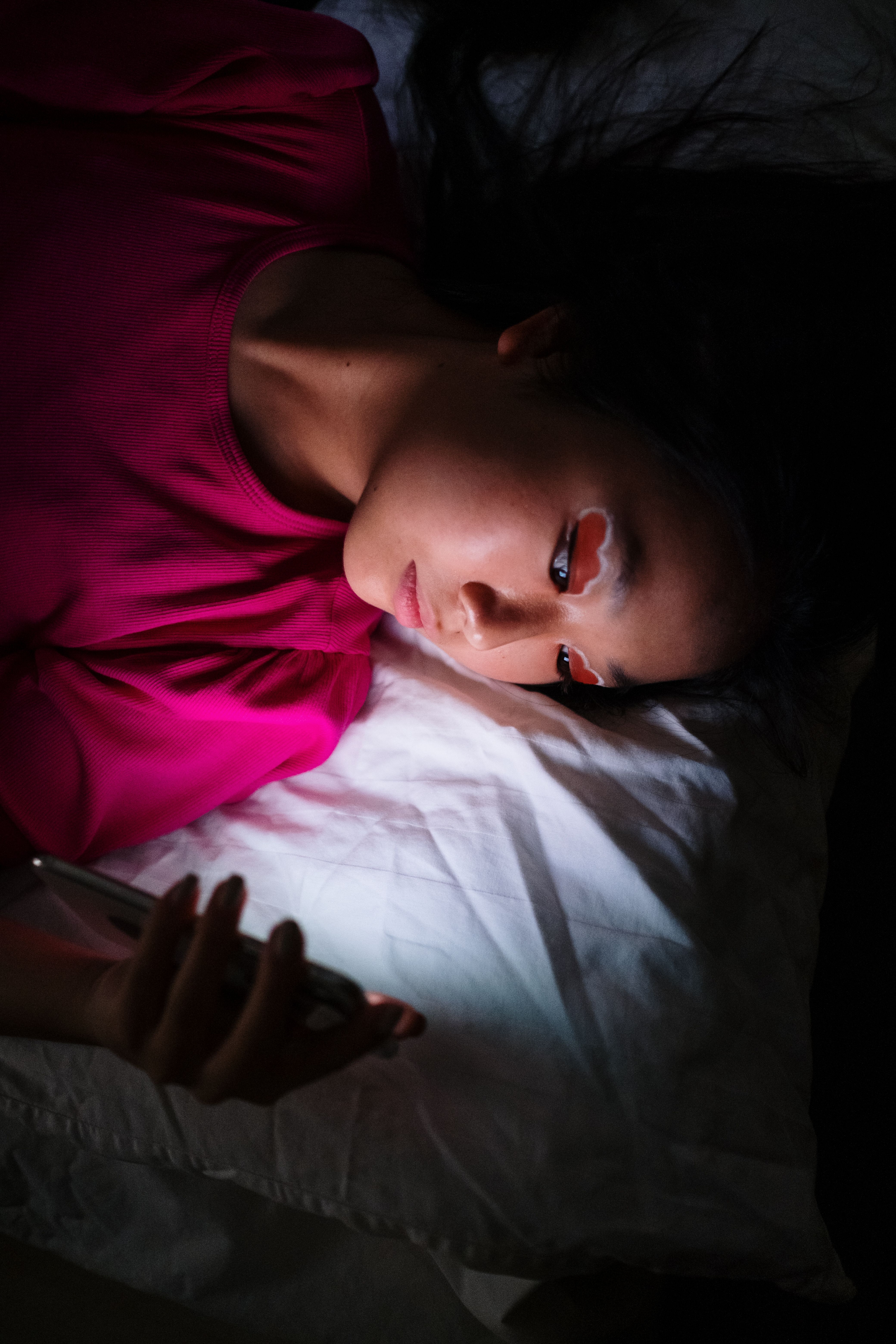 Woman Using a Cellphone during Bedtime · Free Stock Photo