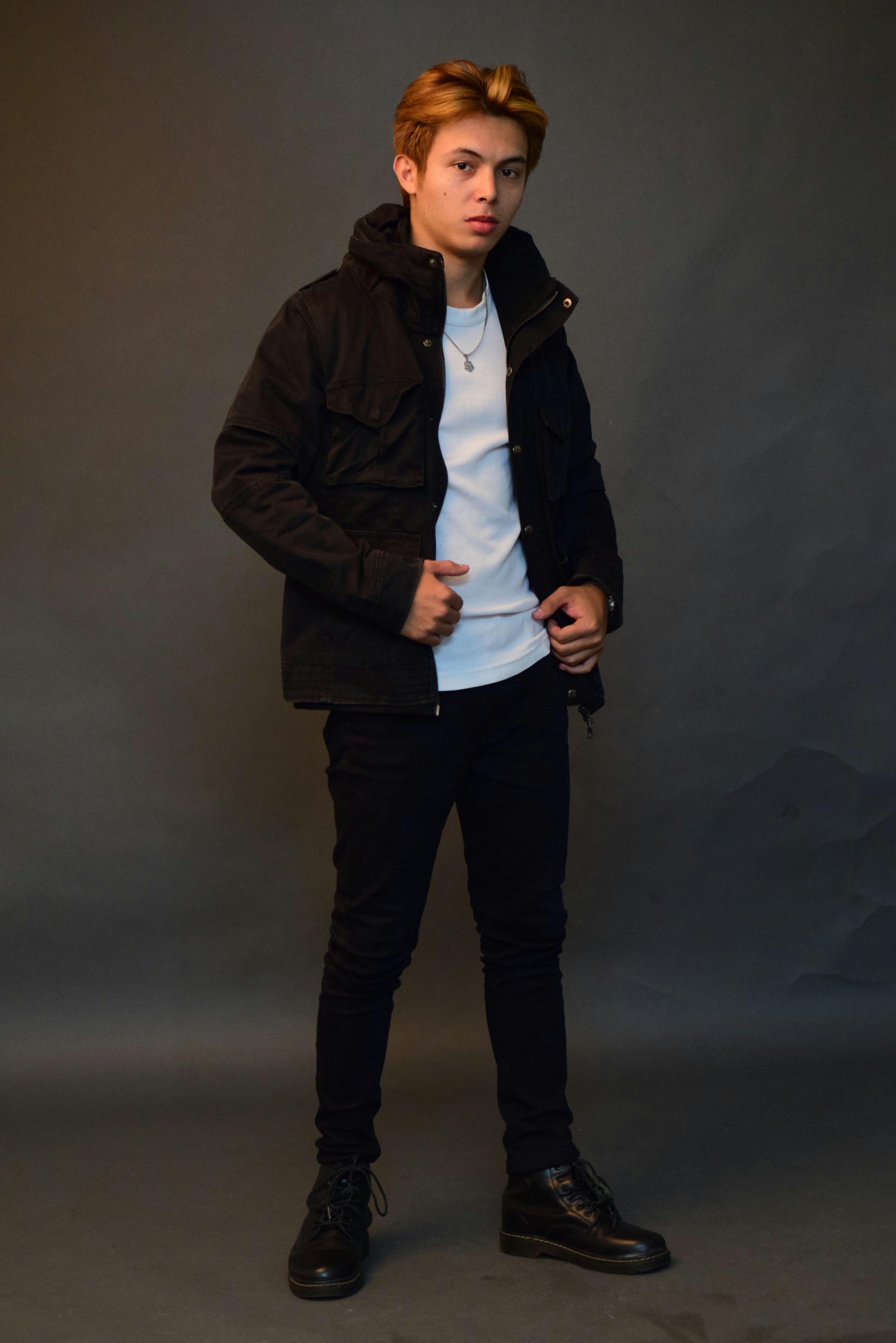 Man and Woman in a Dynamic Pose on a Fashion Photoshoot · Free Stock Photo