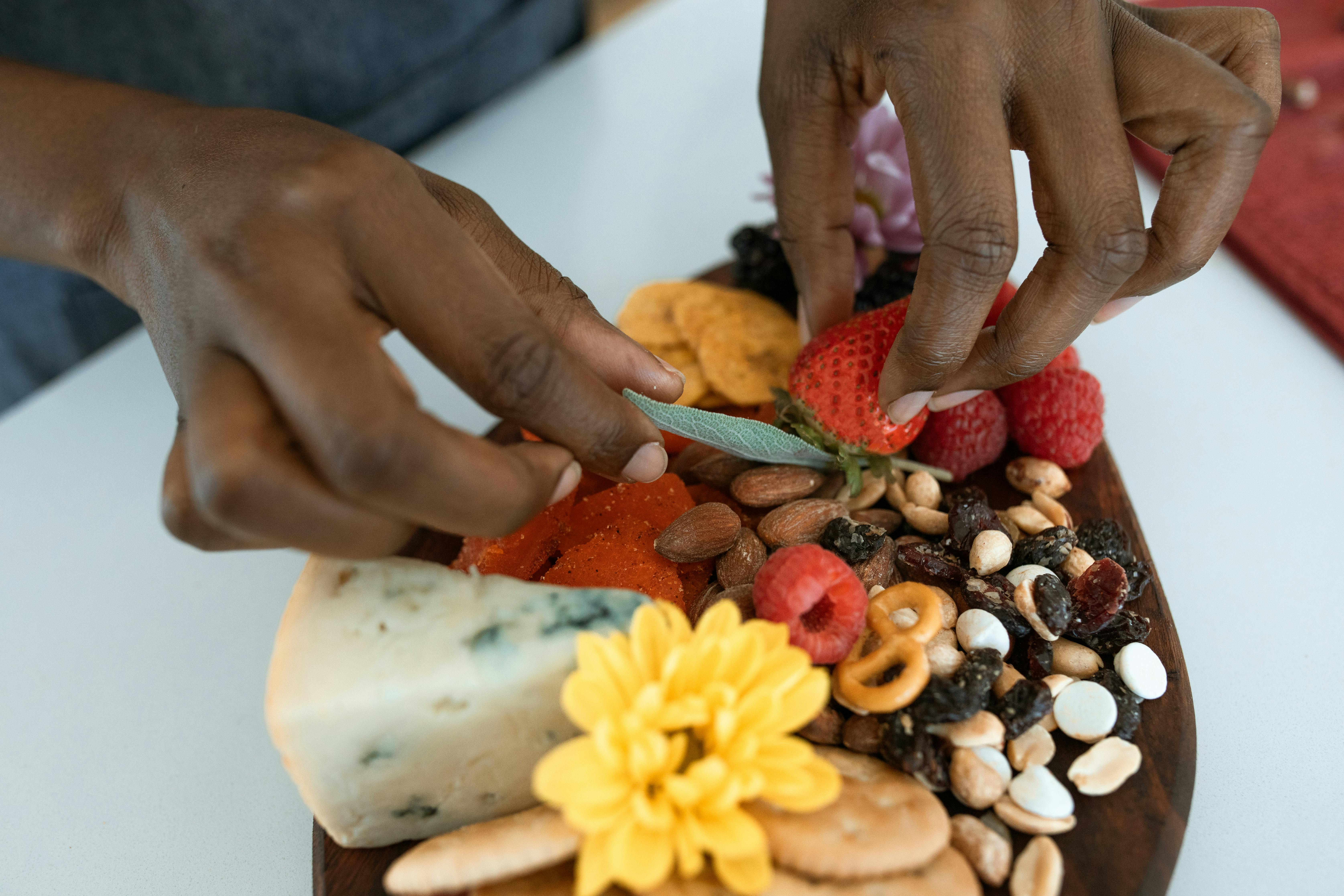 A Person Preparing a Food Platter · Free Stock Photo