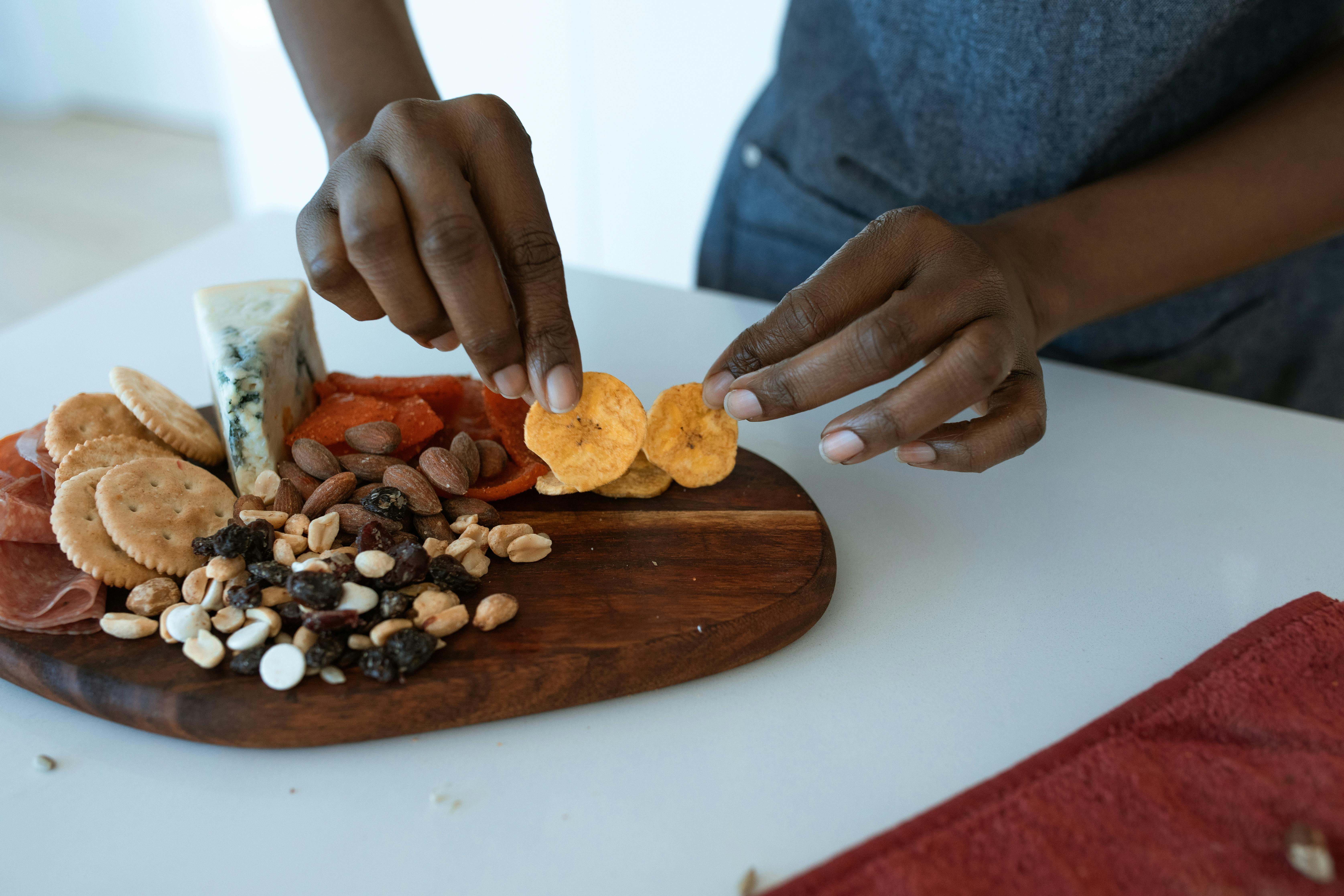 A Person Preparing a Food Platter · Free Stock Photo
